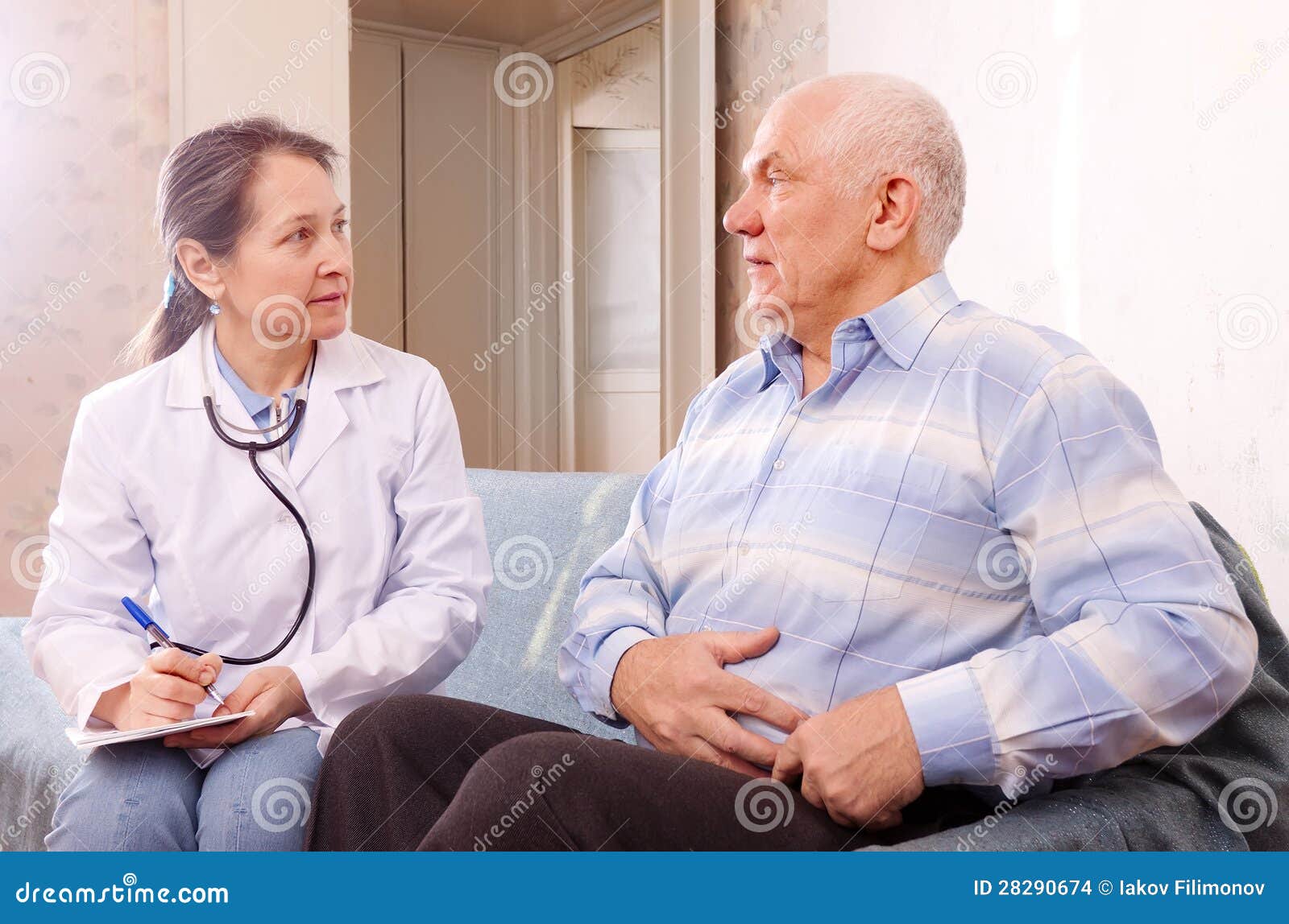 Man Complaining To Doctor about Stomachache Stock Photo - Image of ...