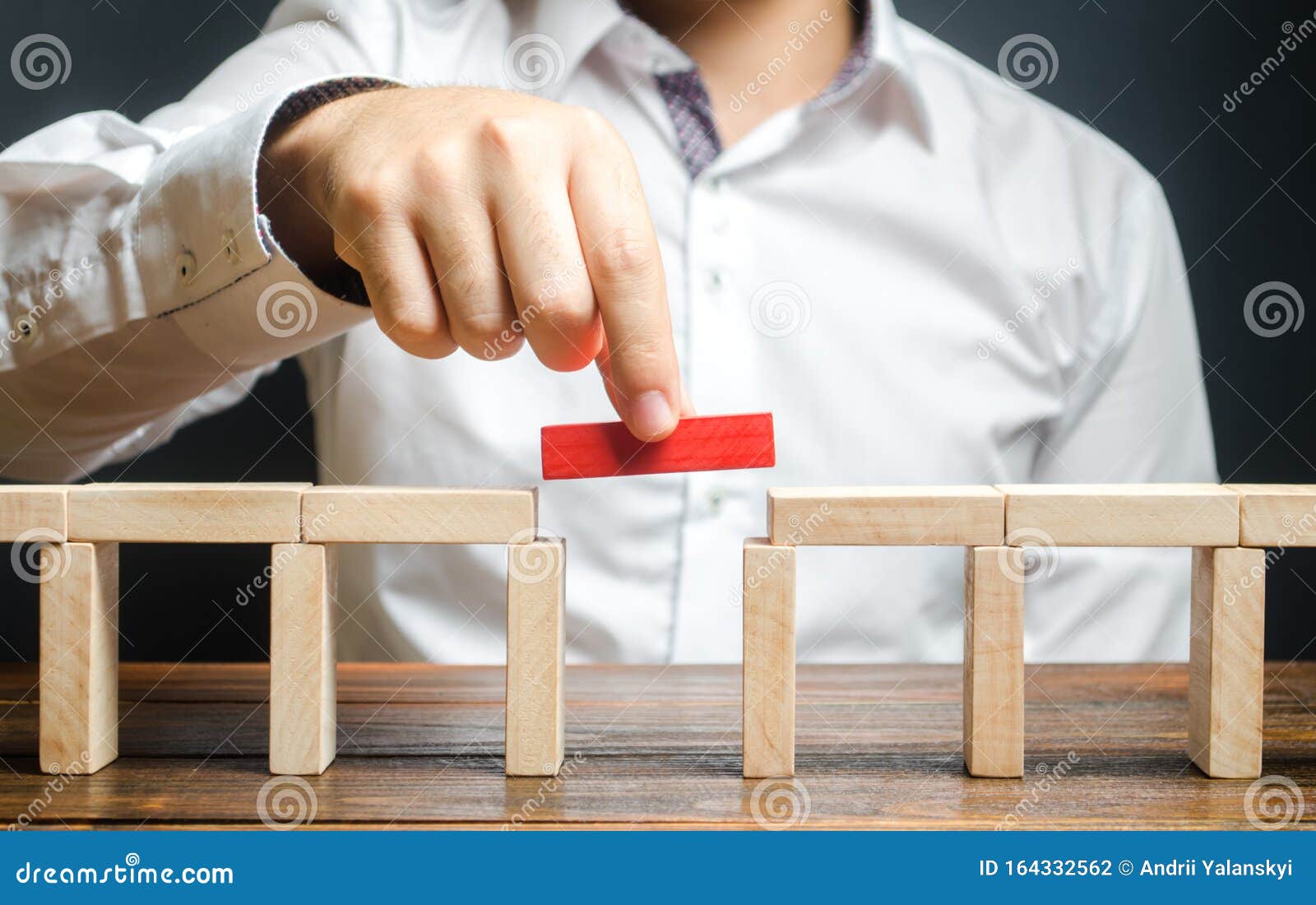 A Man is Completing the Construction of a Bridge. Build Bridges, Make ...