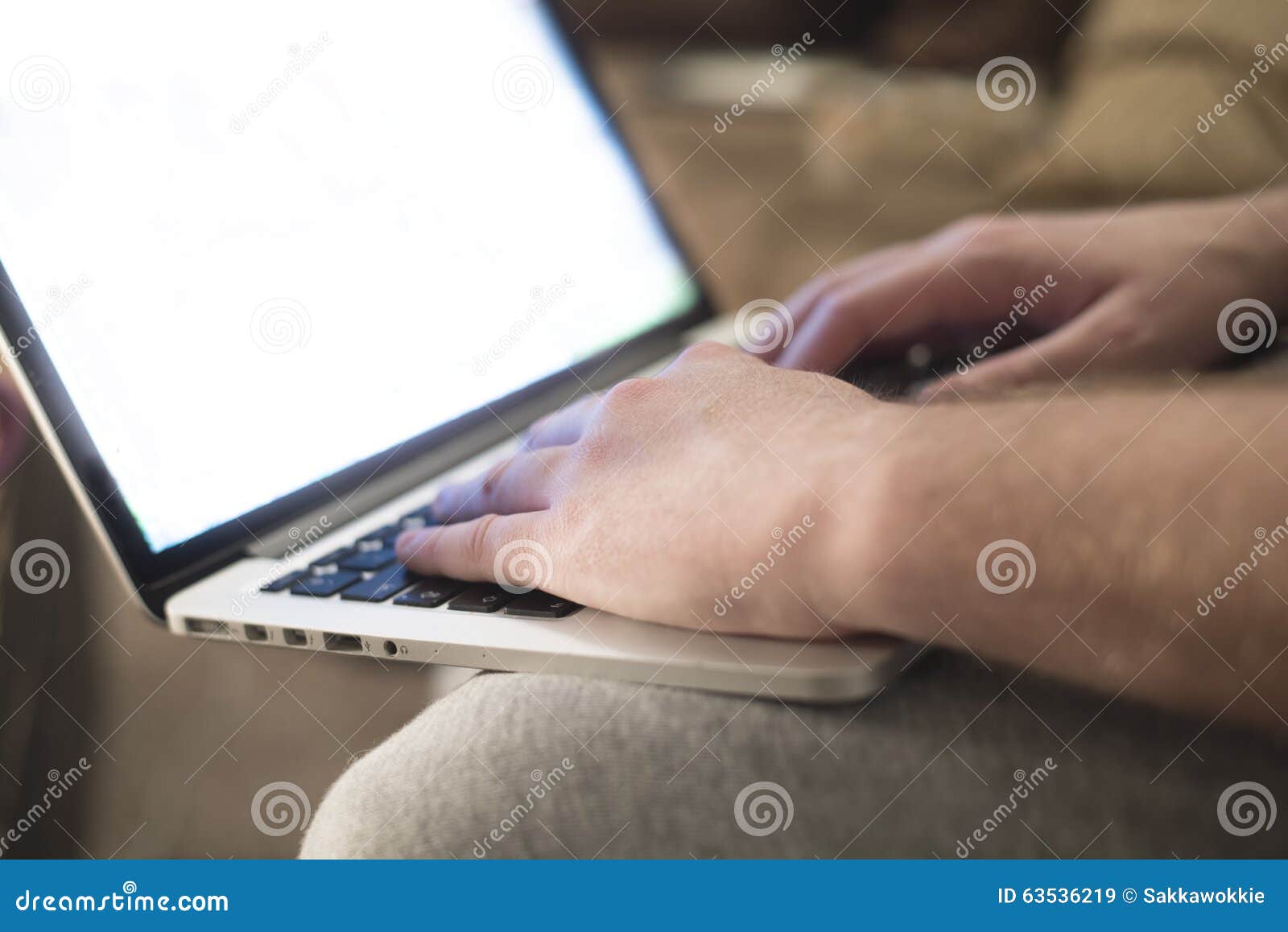 Man with Computer on Lap Typing Stock Image - Image of screen ...