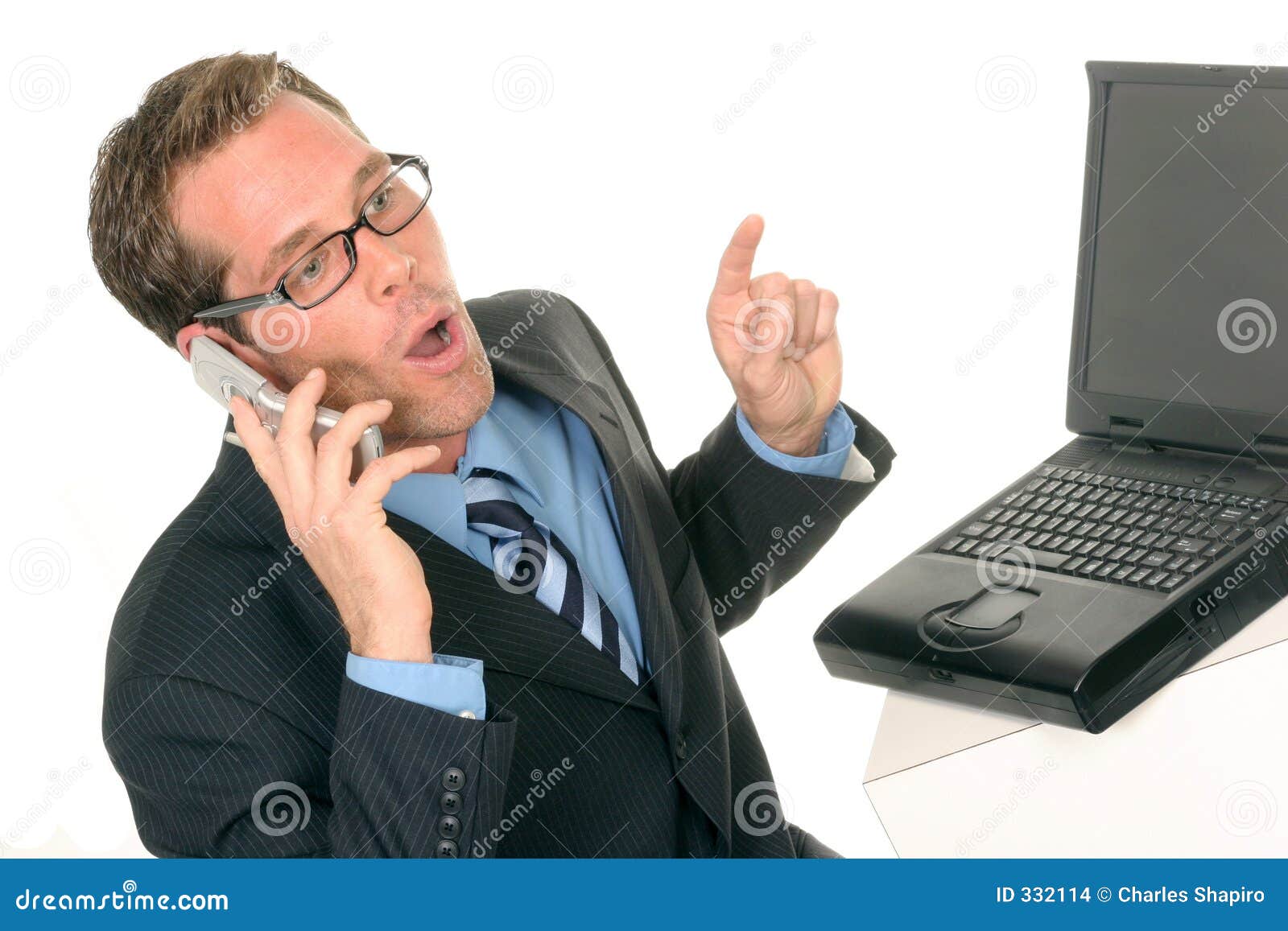 Man with Computer Laptop on His Cell Phone Stock Photo - Image of ...