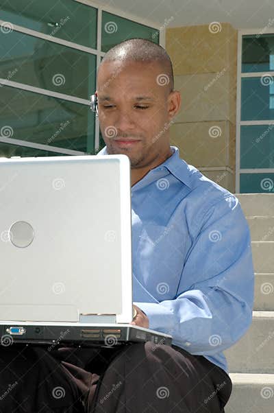 Man on Computer Outside stock photo. Image of gadgets, deal - 676256