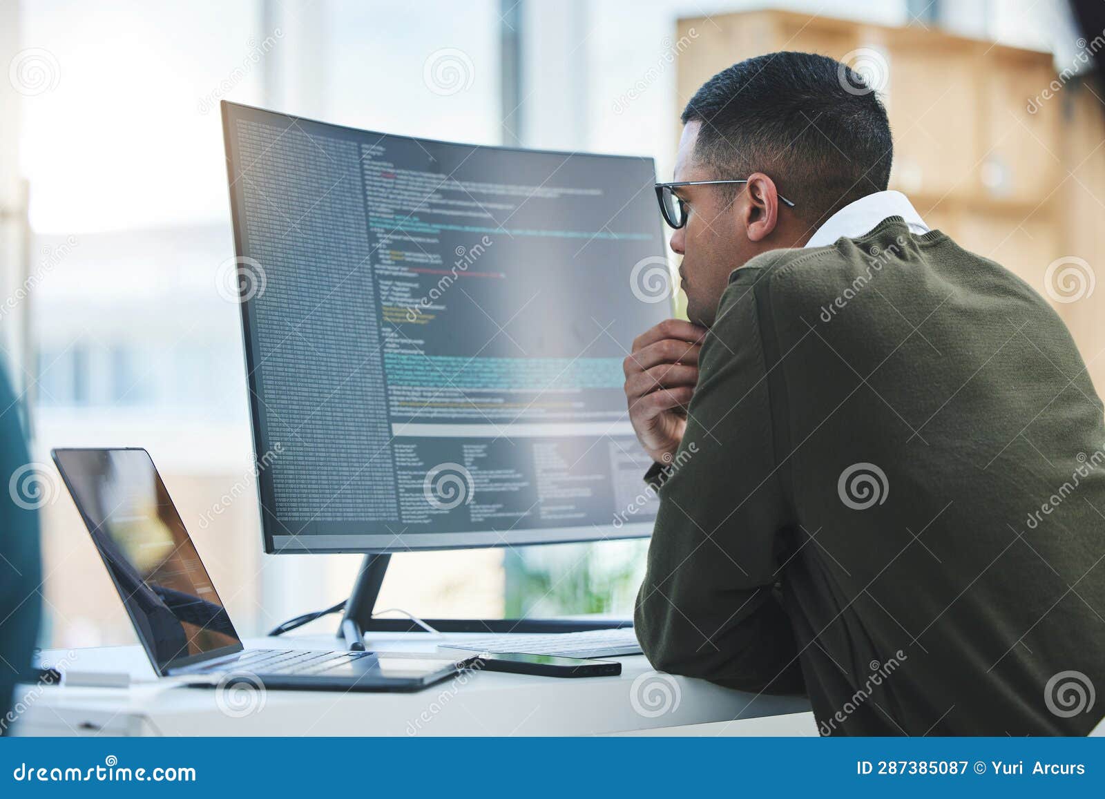 Man, Computer Screen and Thinking of Coding, Programming or Software Development and Online ...