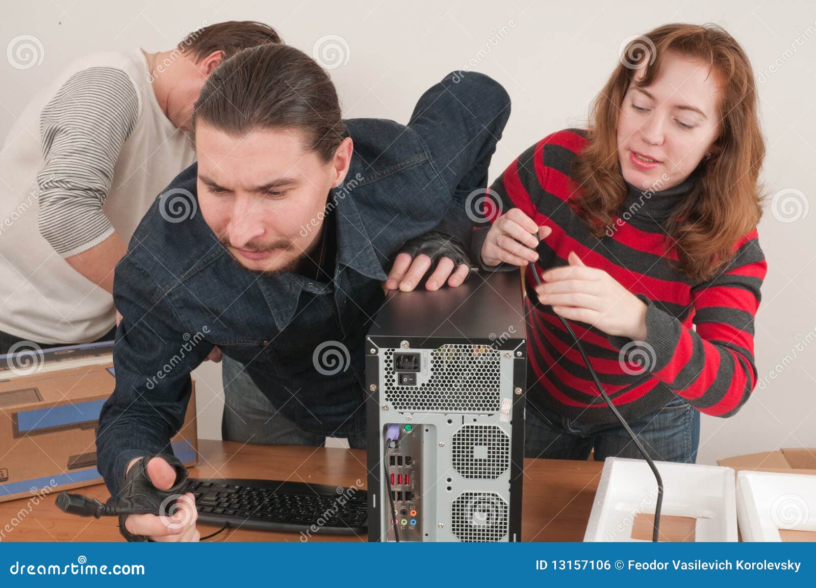 The Man, the Computer and the Woman. Stock Photo - Image of woman ...