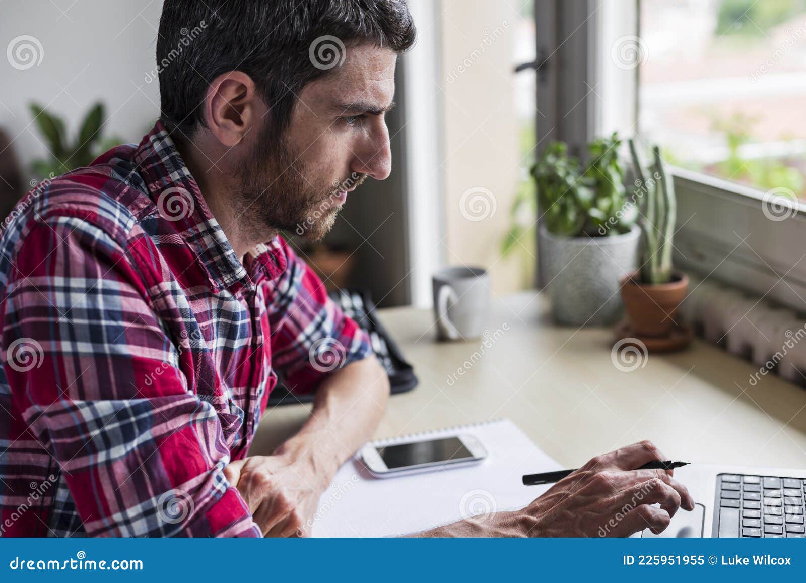 Man concentrating on work stock image. Image of adult - 225951955