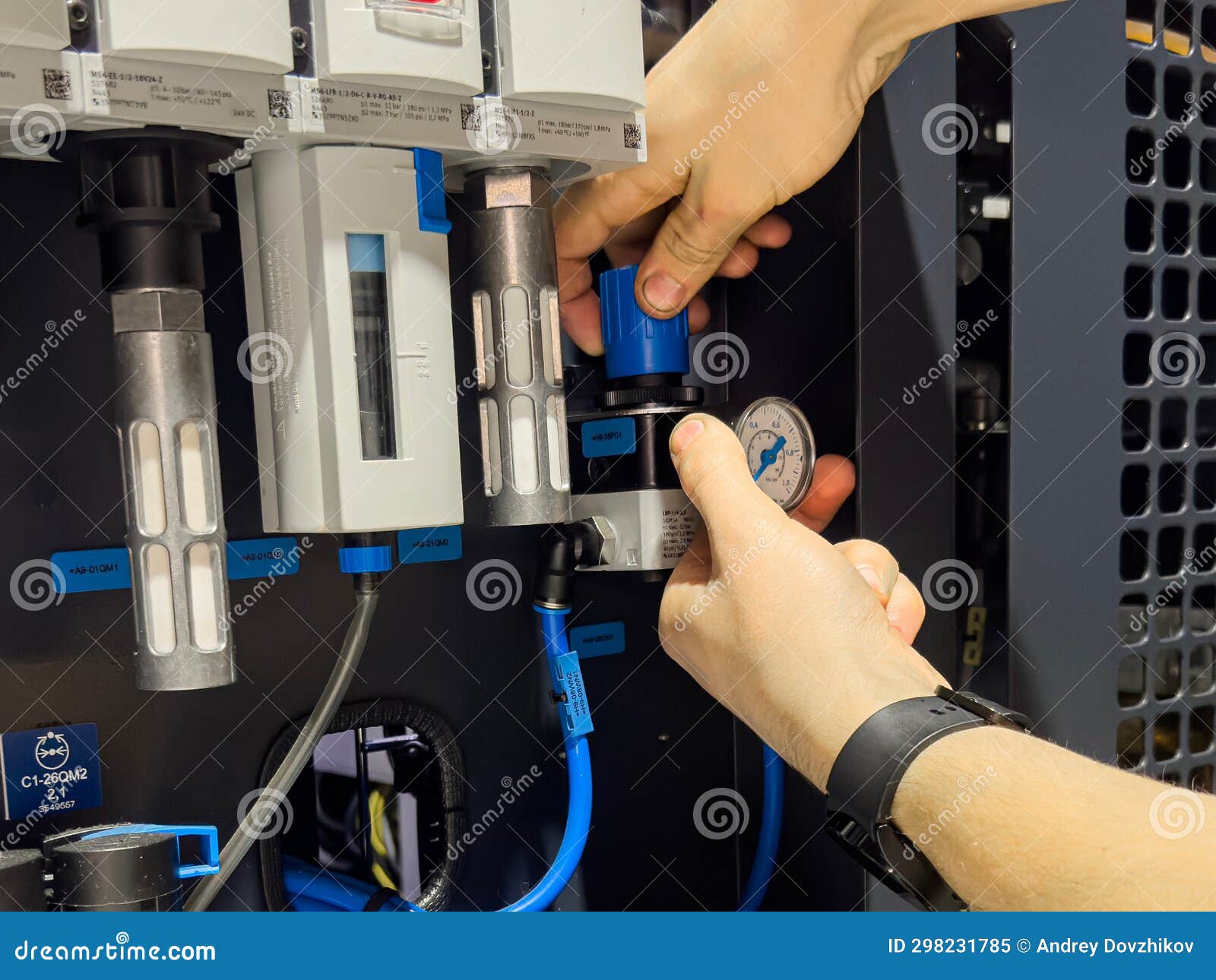 A Man Conducts Electricity for a New CNC Milling Machine Stock Image ...