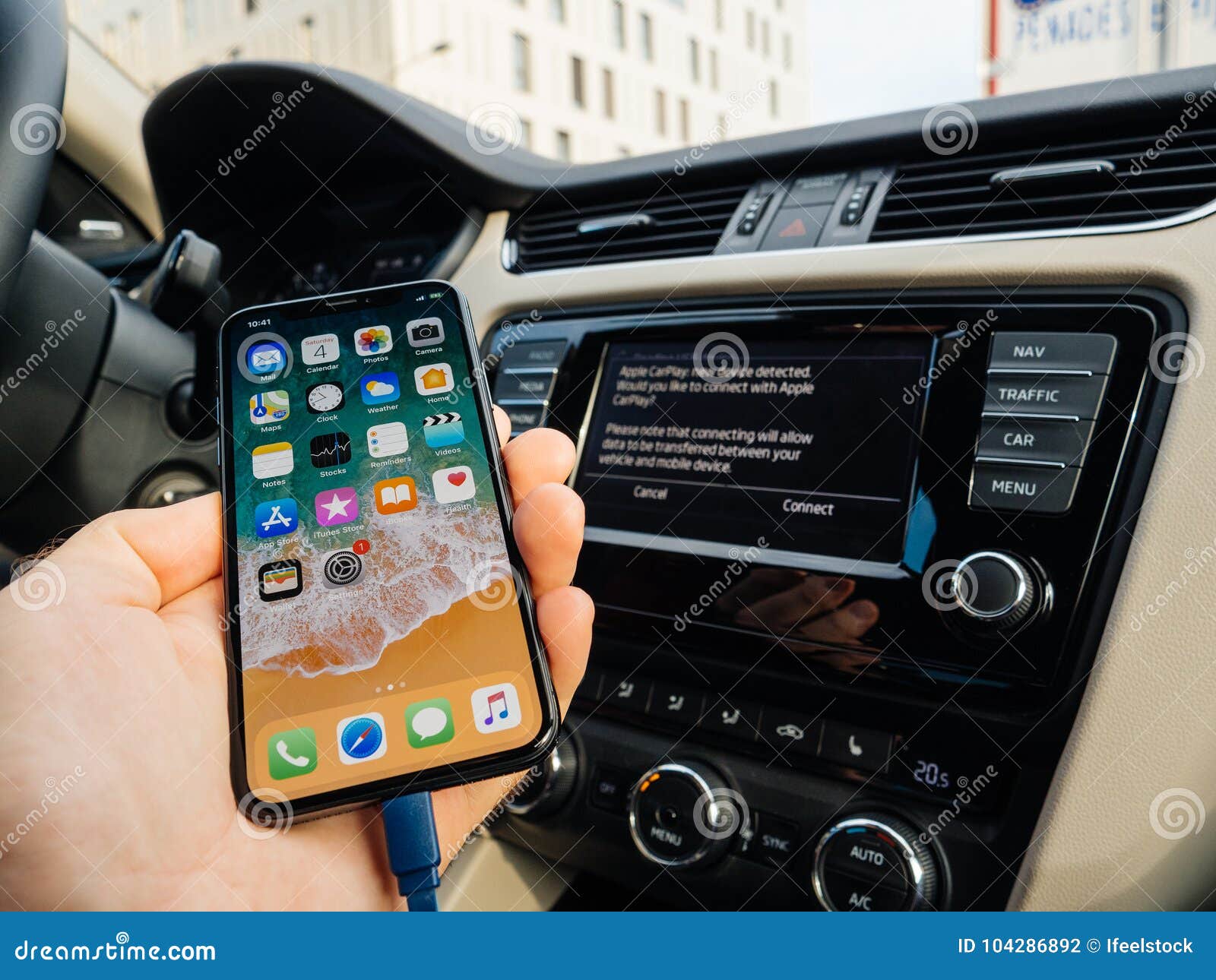 Man Connecting To Apple CArPlay the New Iphone X 10 by Apple Editorial ... Man Connecting To Apple CArPlay the New Iphone X 10 by Apple Editorial ...