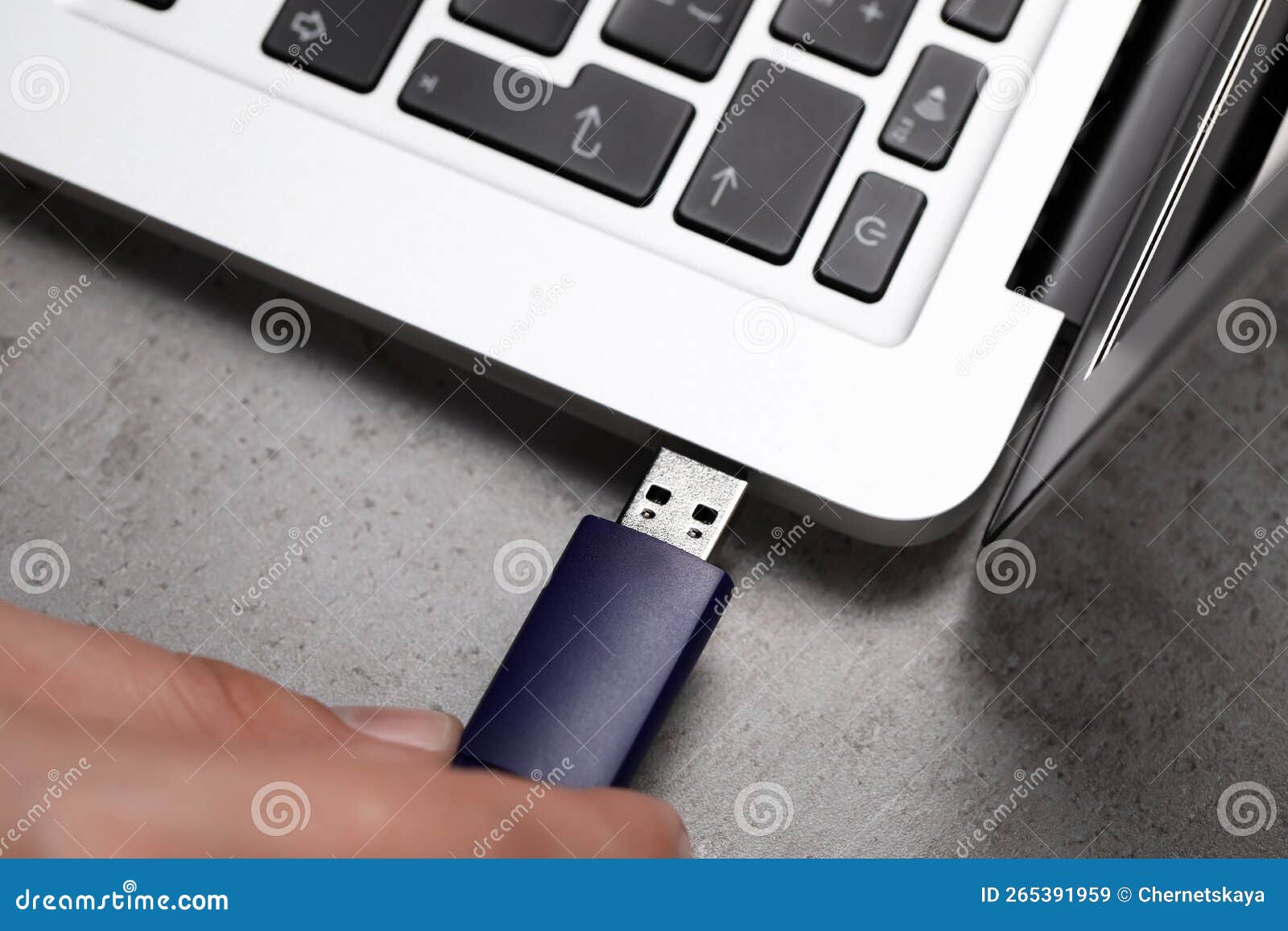 Man Connecting Usb Flash Drive To Laptop at Grey Table, Above View ...