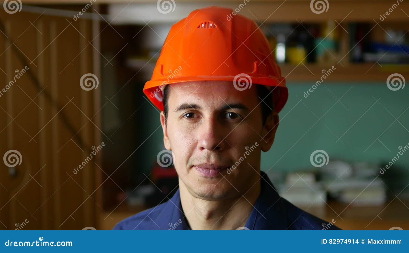 Man Construction Worker in a Hard Hat Indoor Portrait Stock Photo ...