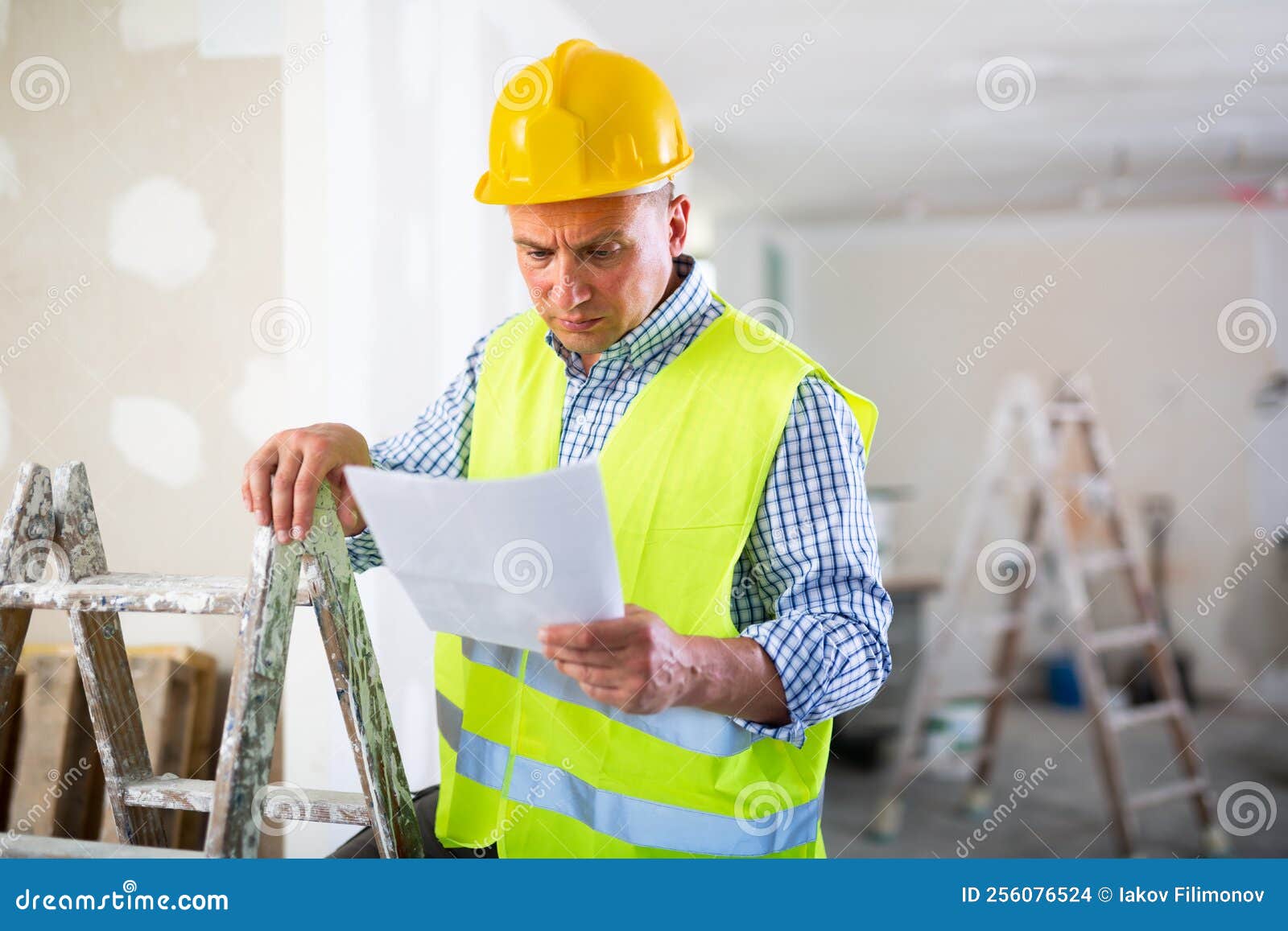 Man Construction Worker Planning Works in Apartment Stock Photo - Image ...