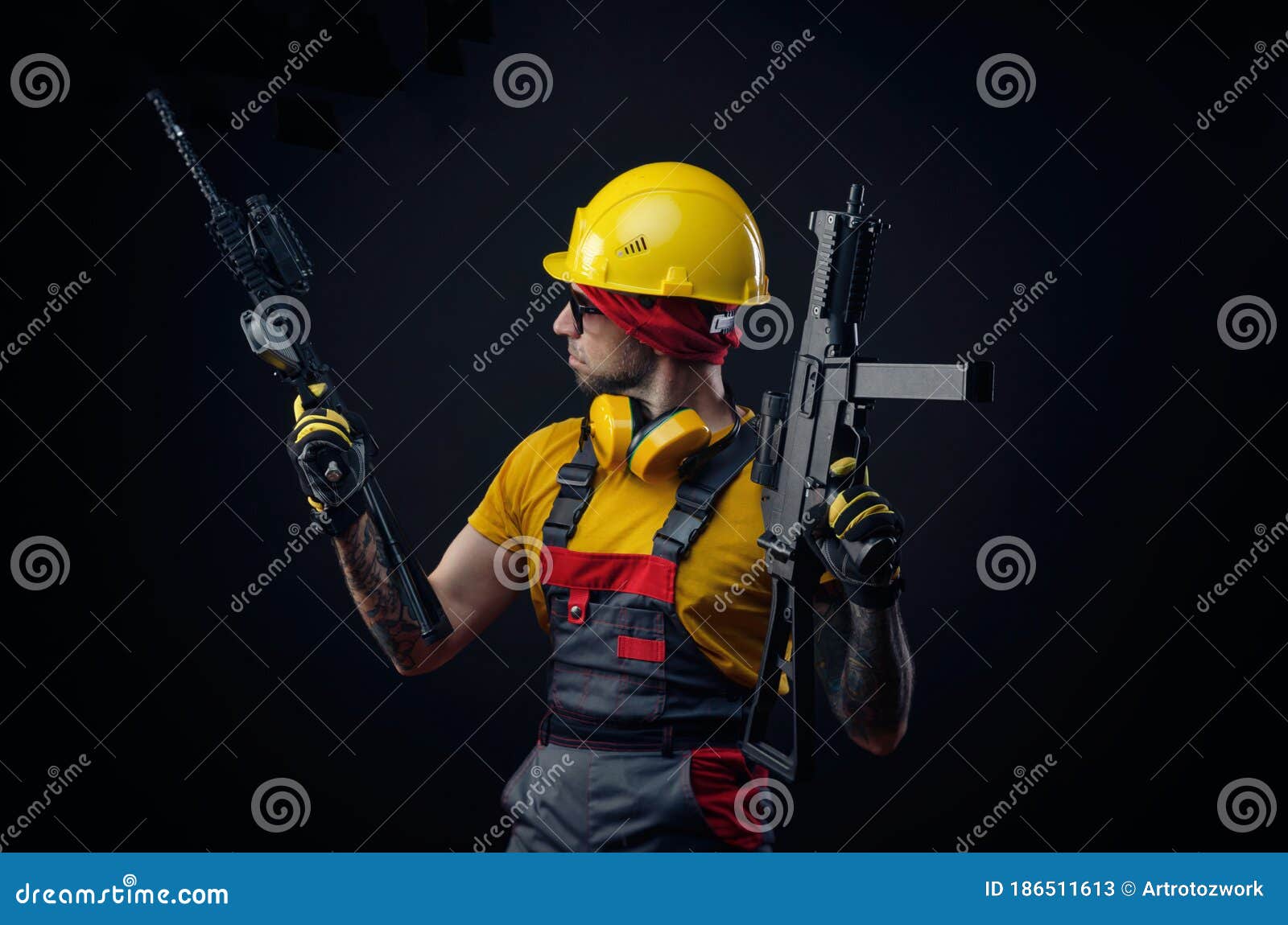 A Man in a Construction Worker`s Uniform Wearing a Hard Hat with an ...