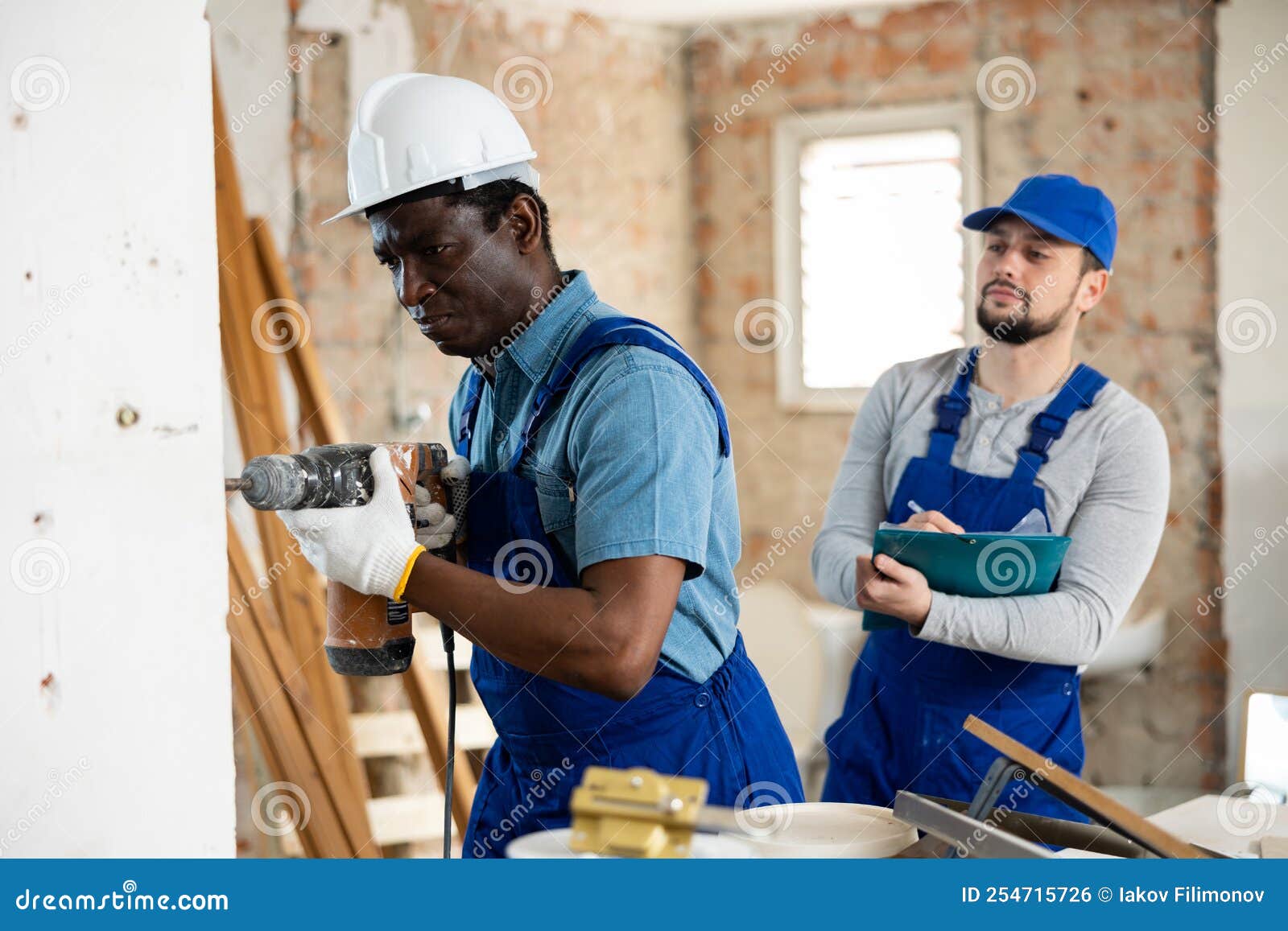 Man Construction Worker Using Demolition Hammer in Apartment Stock ...