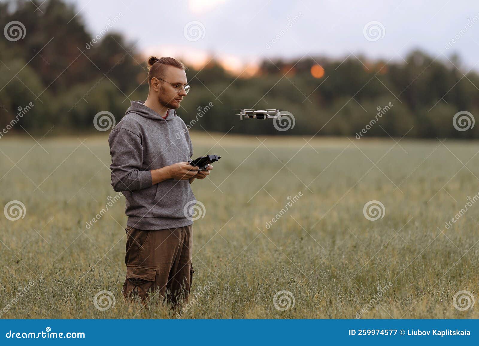 Man Controlling a Drone with a Remote Control Stock Image - Image of ...