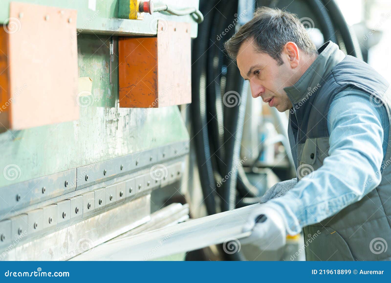 Man Controlling Hydraulic Press Machine for Cutting Steel Stock Image ...