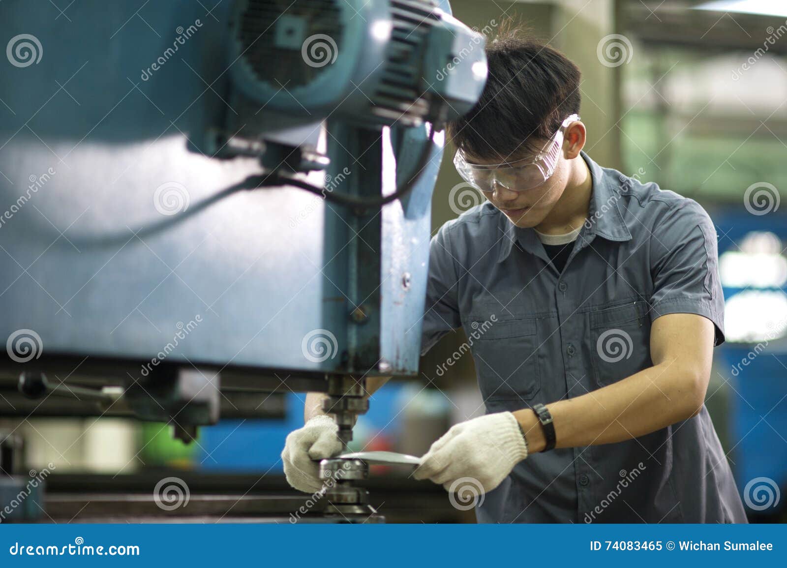 Man Controlling Hydraulic Punching Machine Stock Image - Image of ...