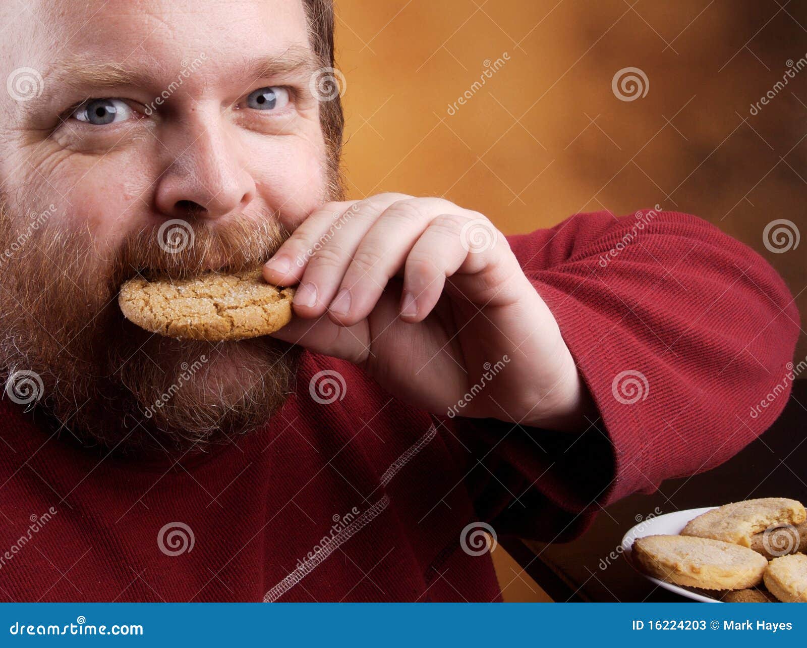 Man with Cookie stock image. Image of digestion, middle - 16224203