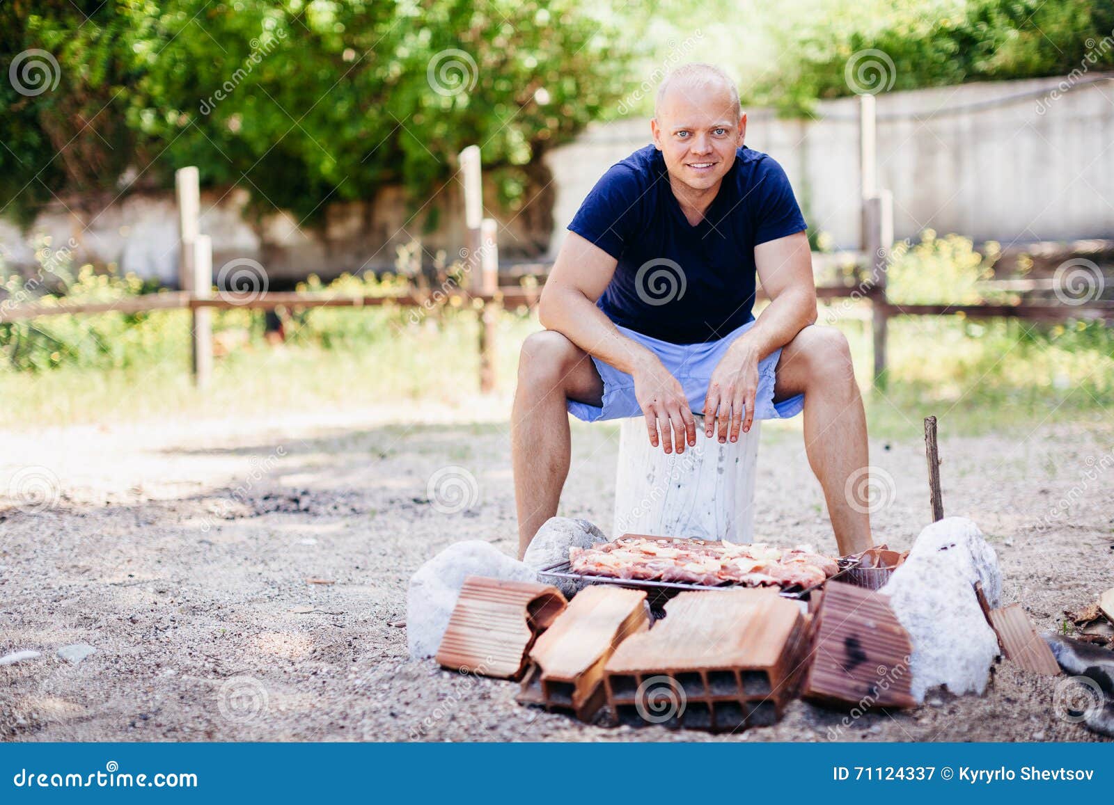 Man cooking BBQ stock image. Image of grill, barbecue - 71124337