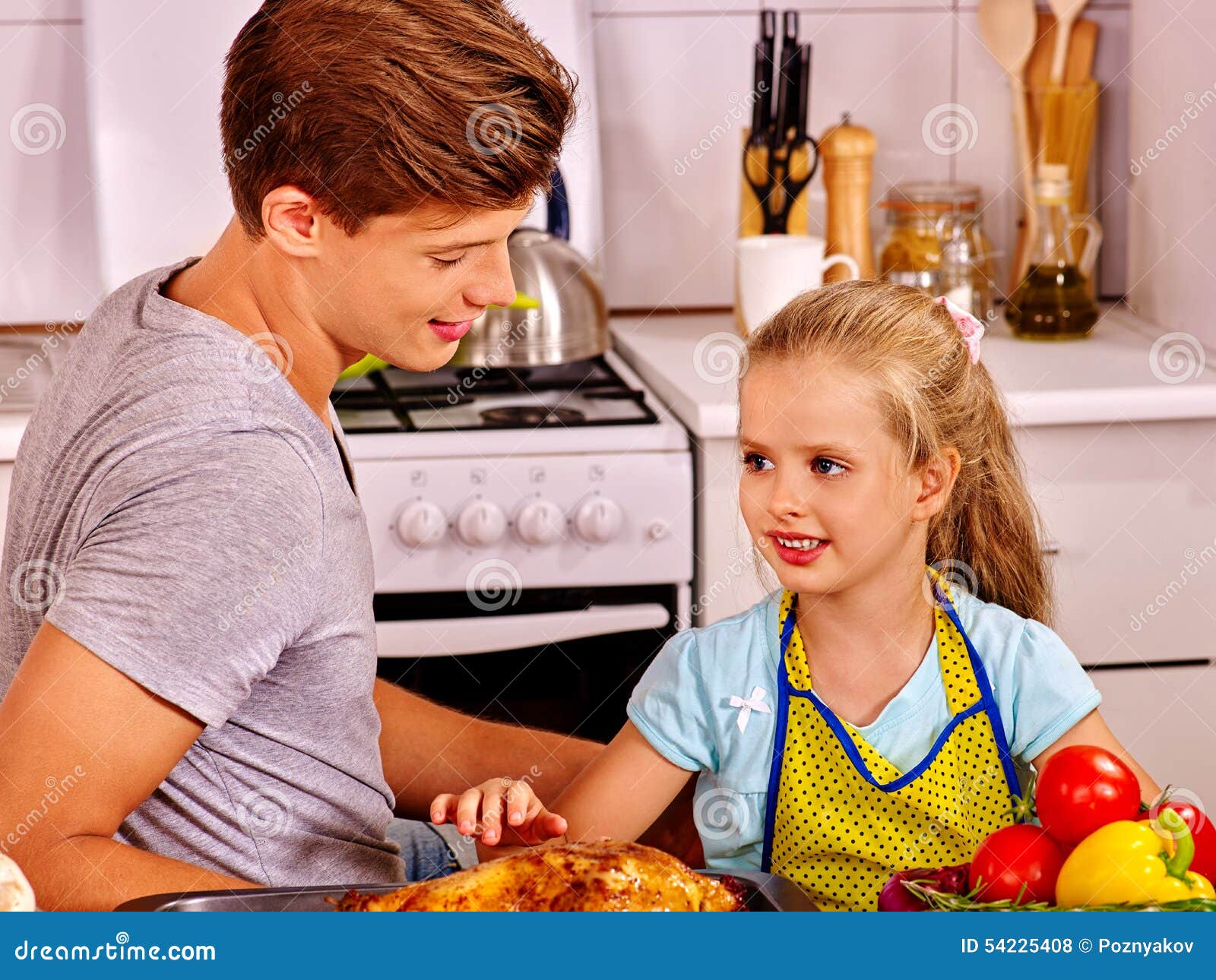 Man Cooking Chicken at Kitchen Stock Photo - Image of kitchen, party ...