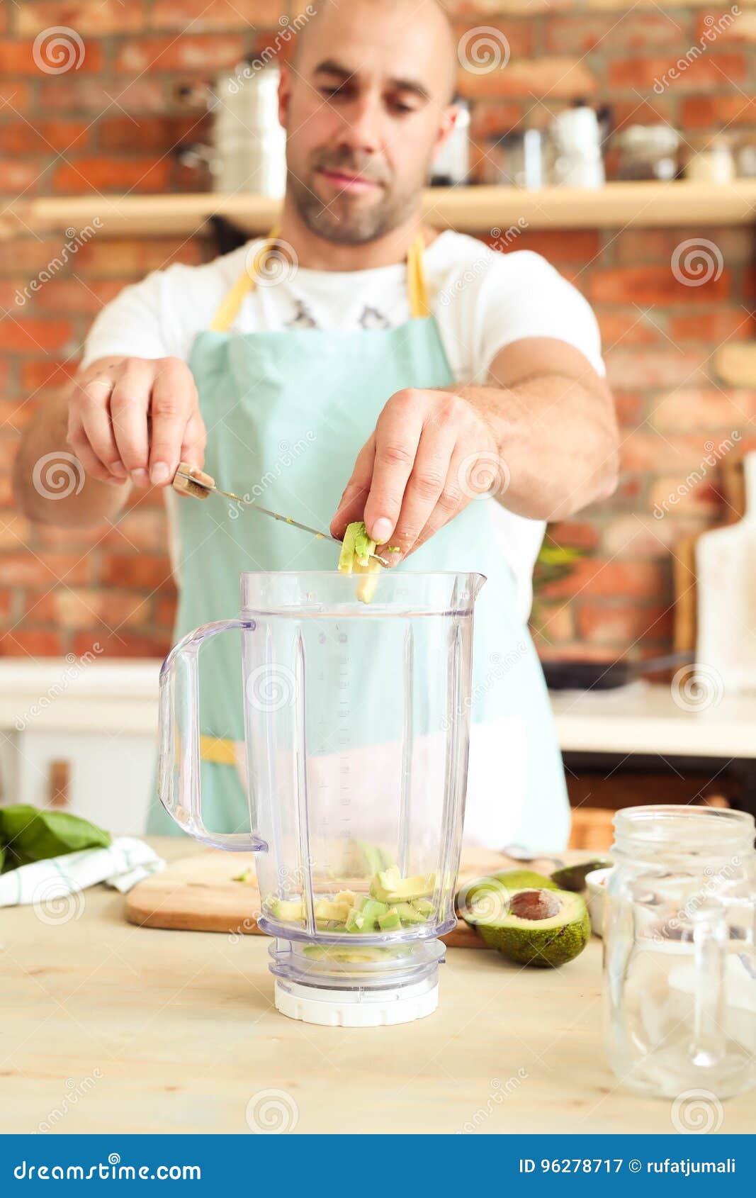 Man cooking stock image. Image of handsome, house, background - 96278717