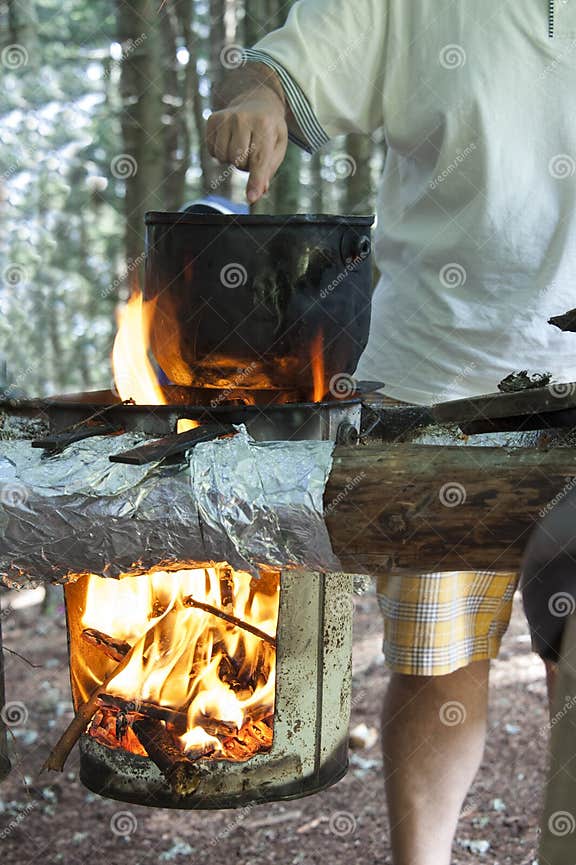 Man Cooking Dinner on Campfire Stock Image - Image of adventure, fried ...