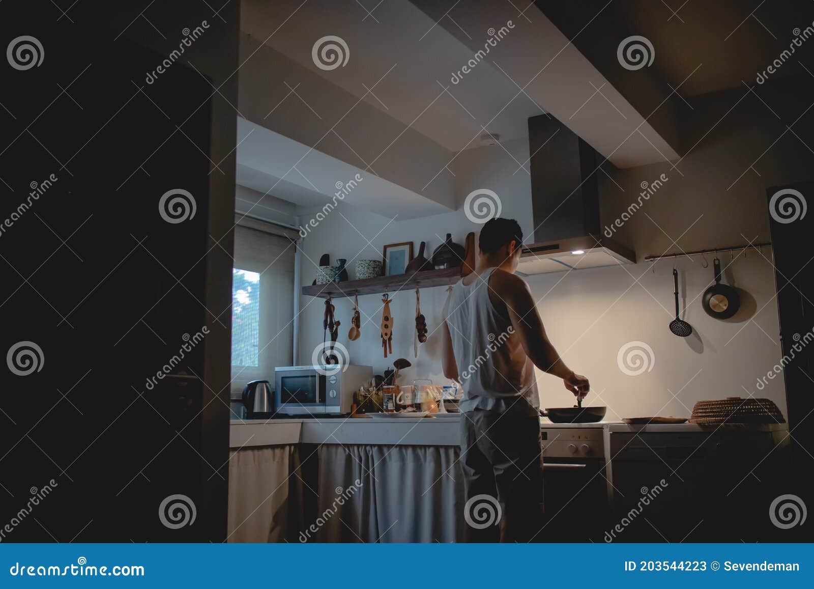 Man is Cooking Dinner in the Kitchen. Stock Image - Image of manly ...