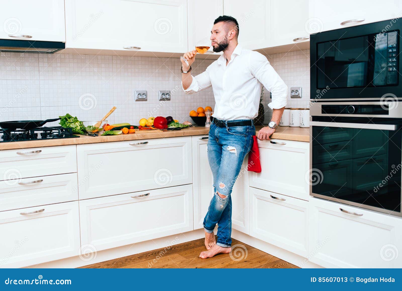Man Cooking and Drinking a Glass of Wine. Stock Image - Image of diet ...