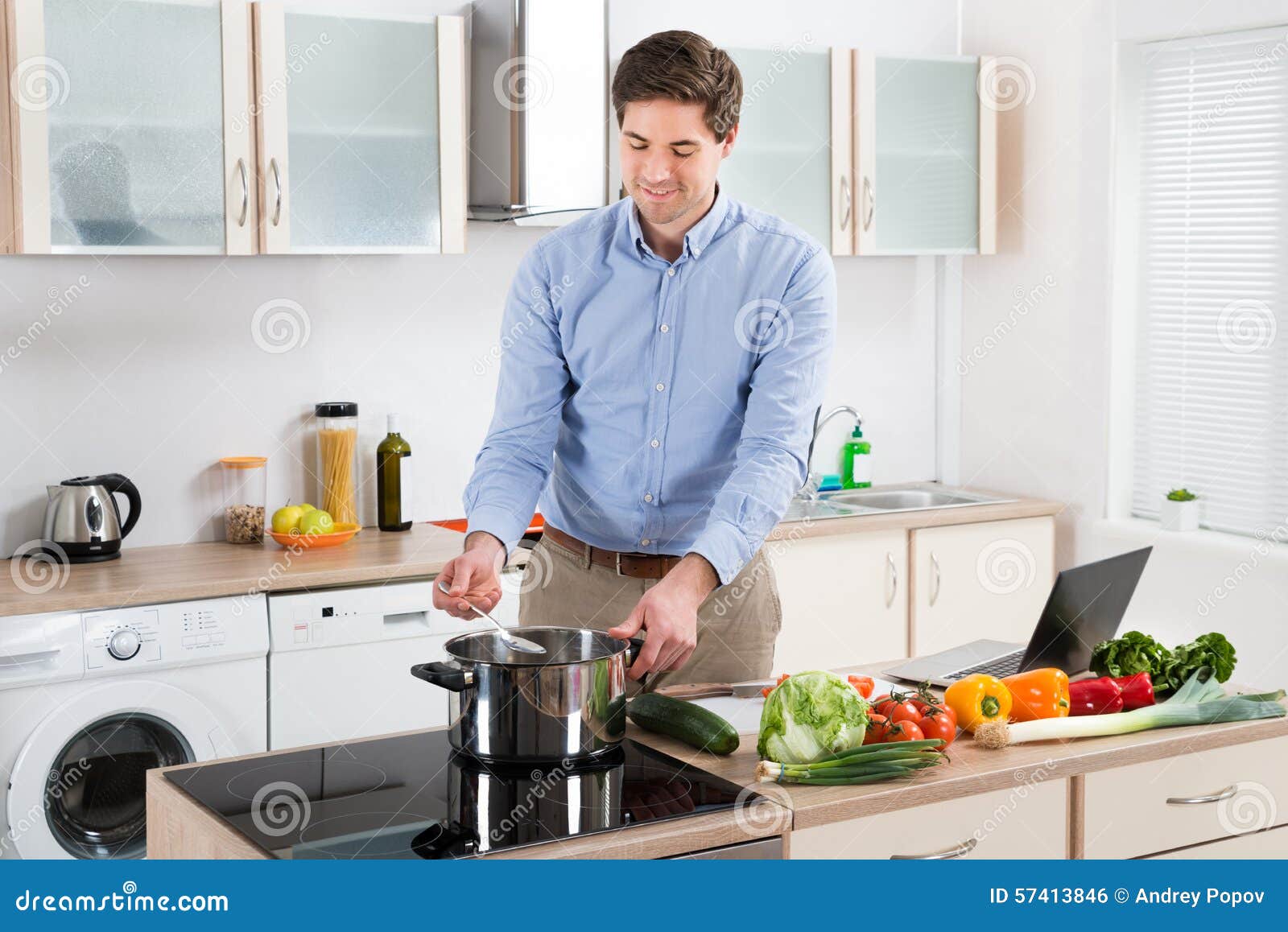 Man Cooking Food in Kitchen Stock Photo - Image of fresh, lunch: 57413846