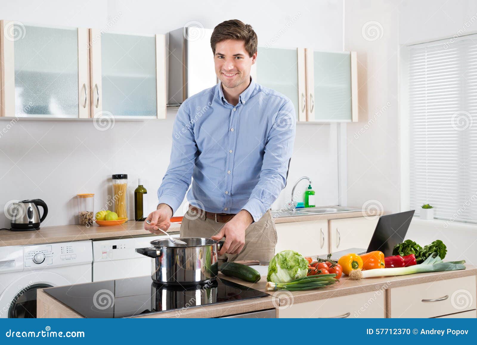 Man Cooking Food in Kitchen Stock Photo - Image of healthy, lunch: 57712370