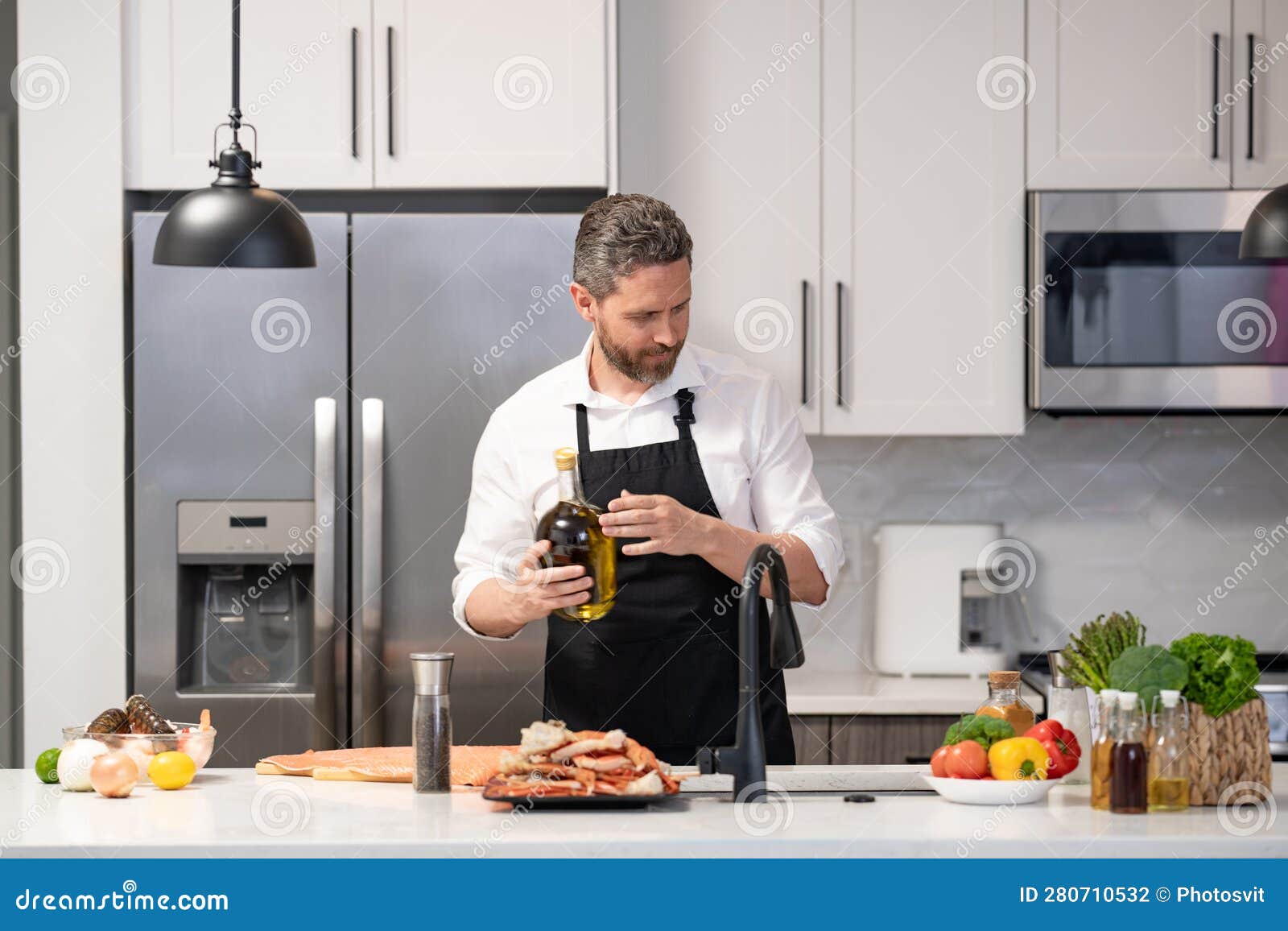 Man Cooking Healthy Food in the Restaurant Kitchen Stock Photo - Image ...