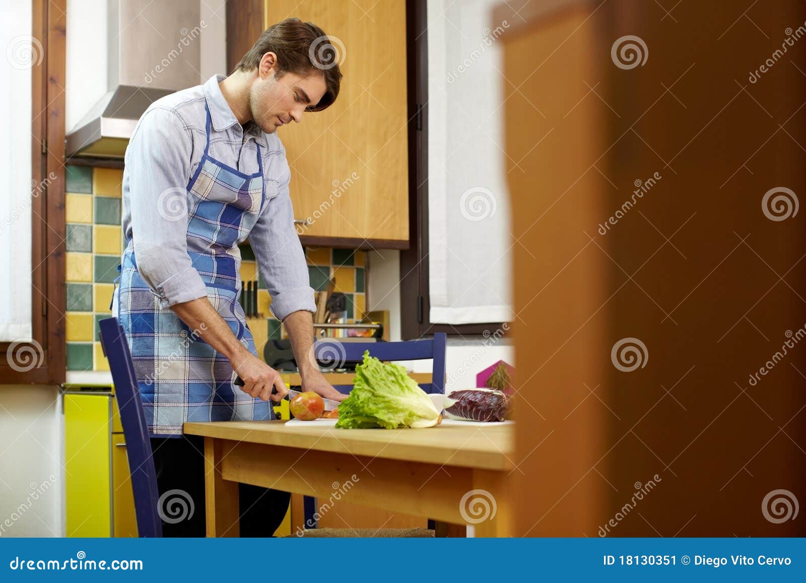 Man cooking at home stock image. Image of salad, cooking - 18130351