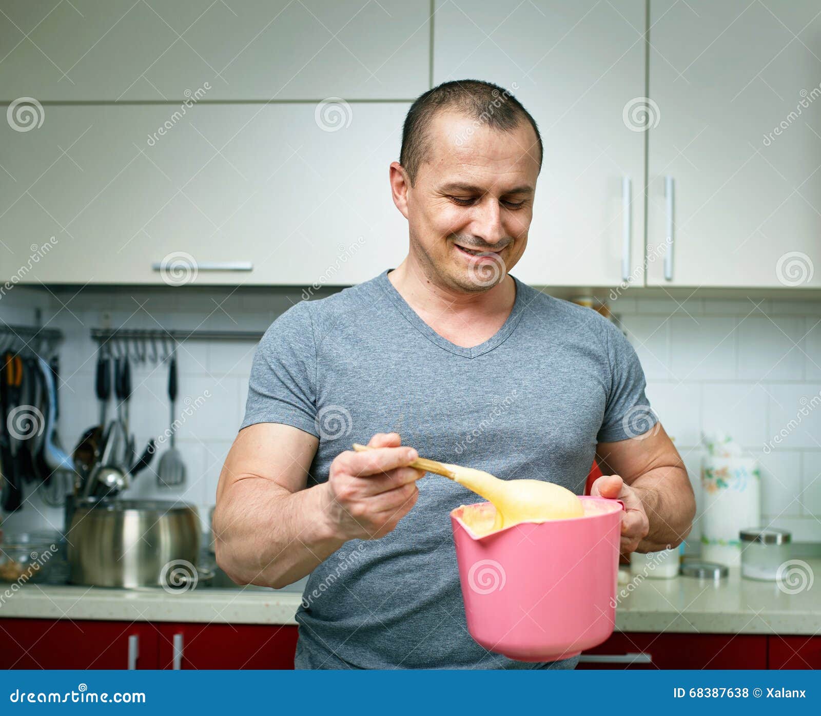 Man cooking at home stock photo. Image of home, hands - 68387638