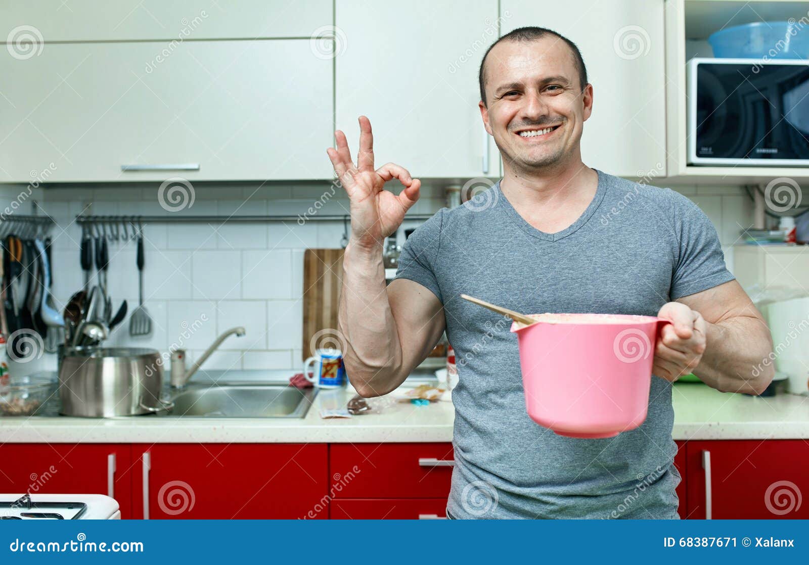 Man cooking at home stock image. Image of cuisine, indoors - 68387671