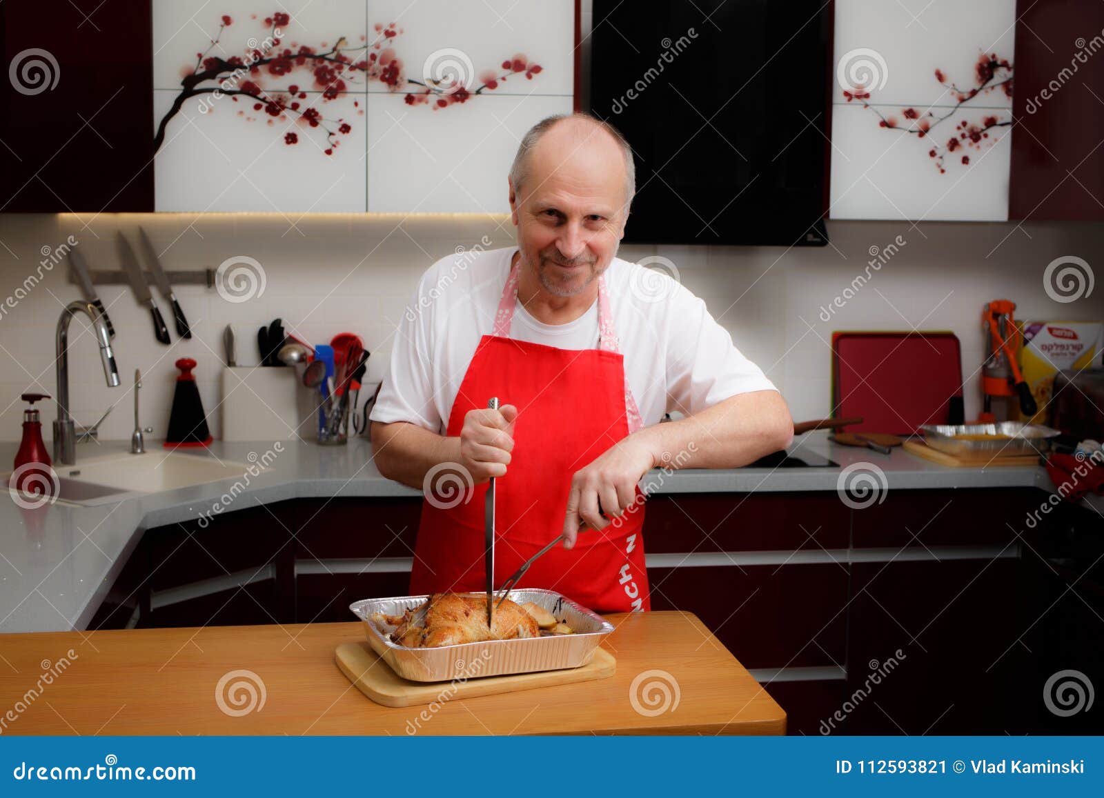 A Man is Cooking in the Kitchen Stock Image - Image of male, food ...
