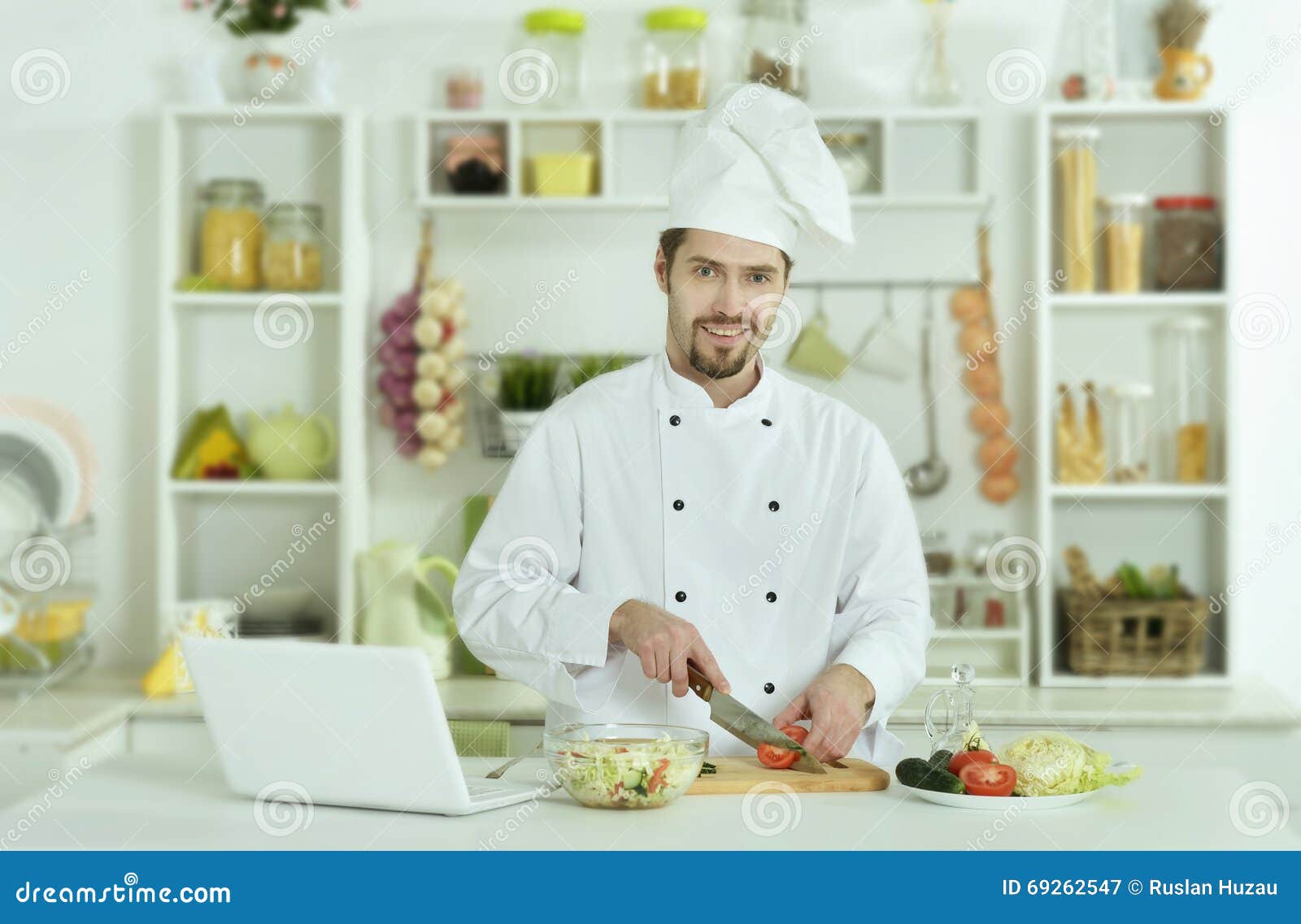 Man cooking in kitchen stock image. Image of handsome - 69262547
