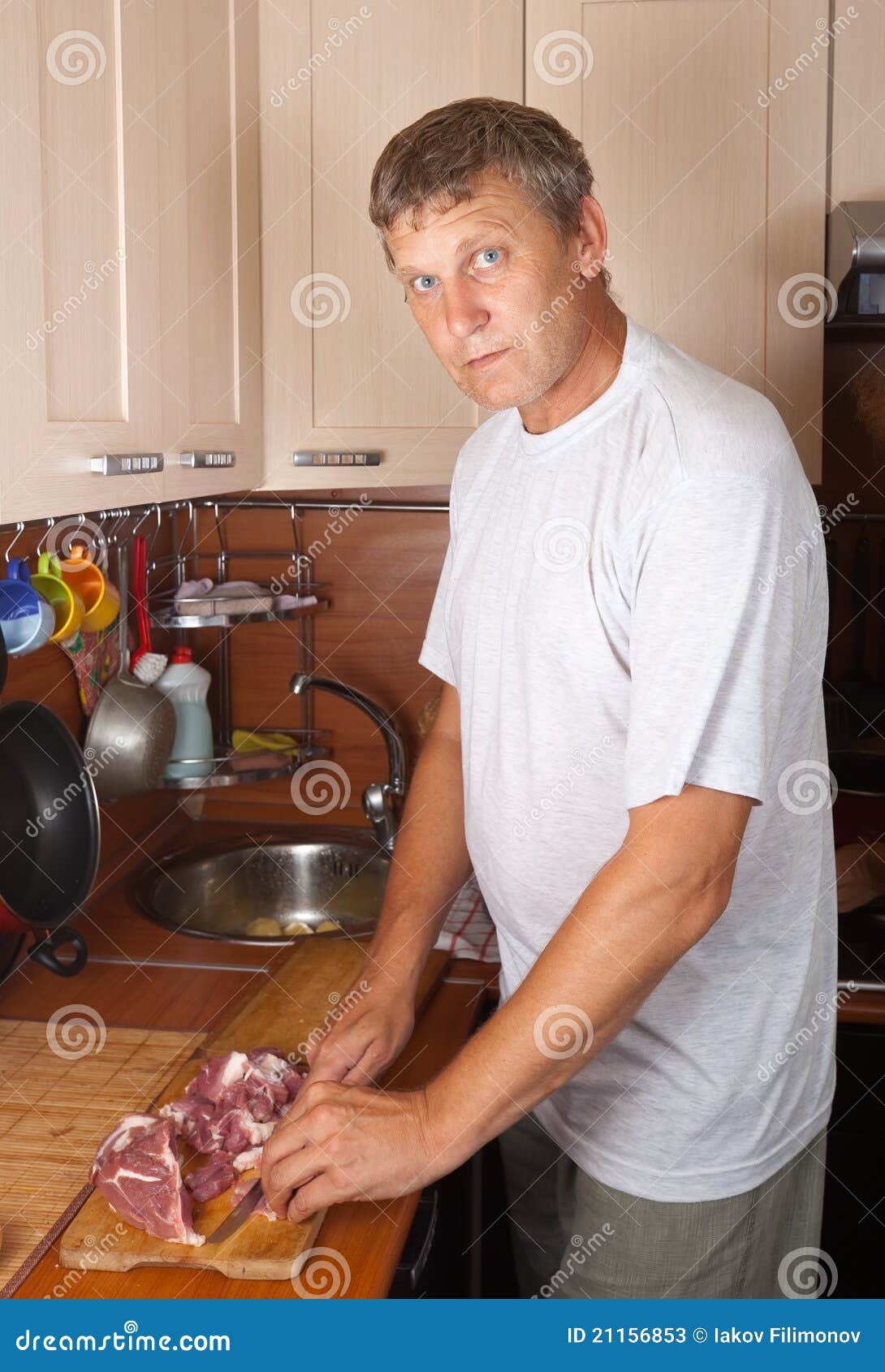 Man cooking meat stock image. Image of pork, culinary - 21156853