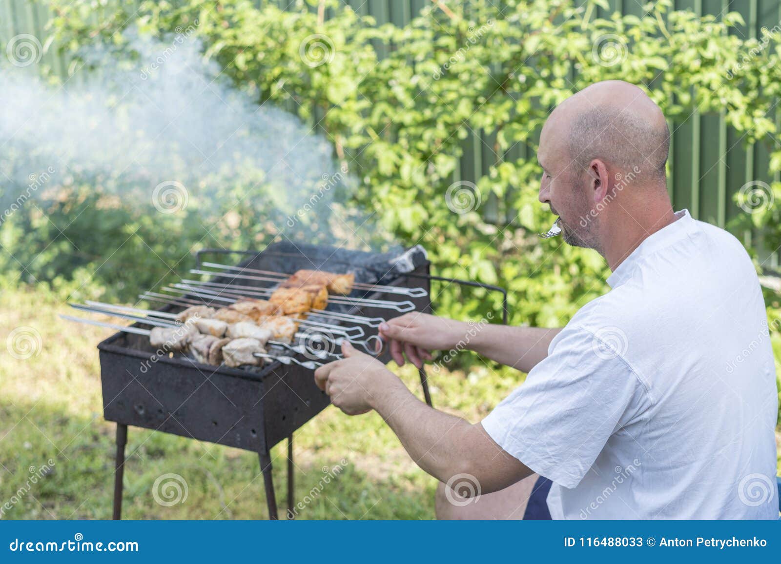 Man Cooking Meat on Barbecue Stock Image - Image of nature, leisure ...