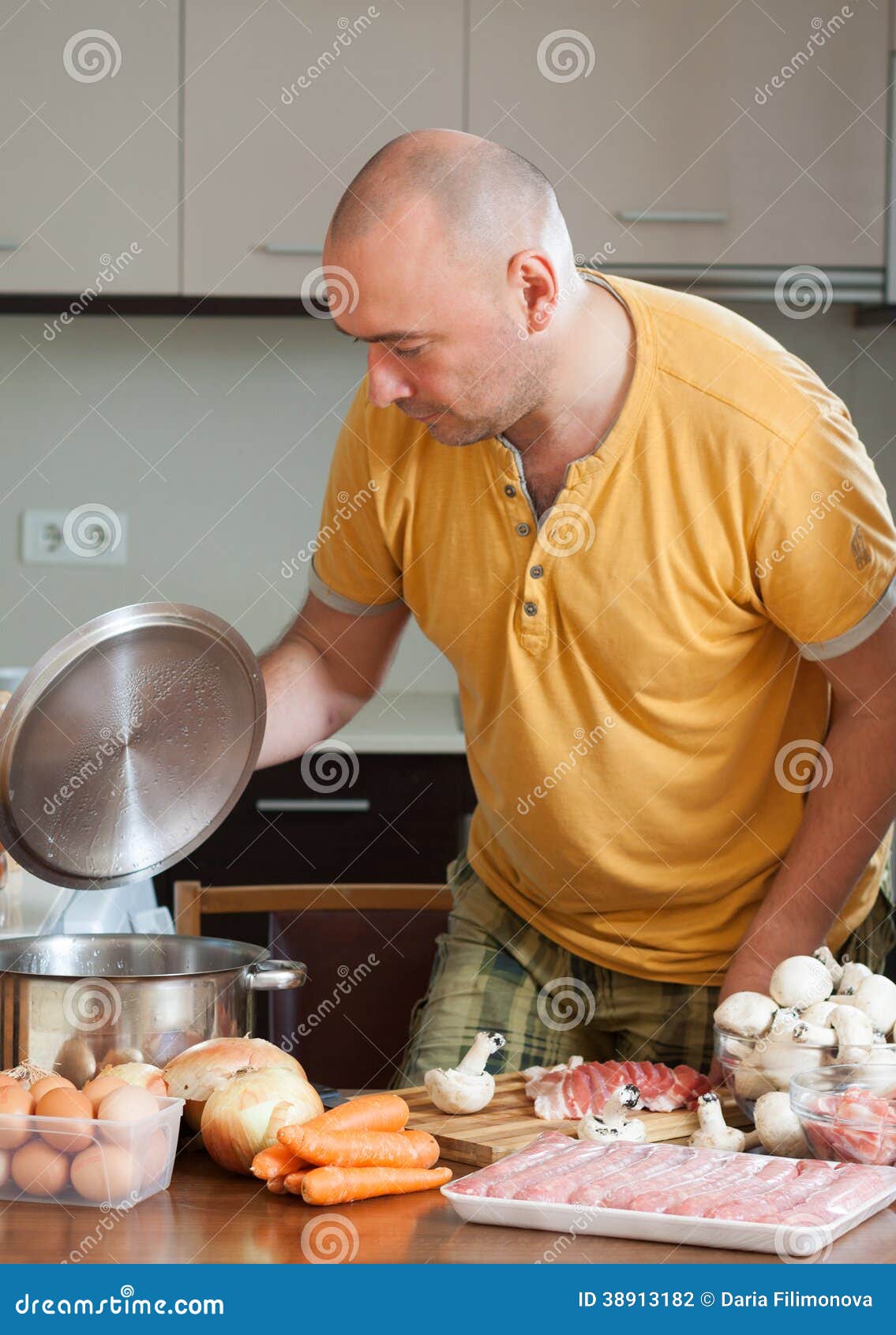 Man cooking meat stock photo. Image of showing, cooking - 38913182