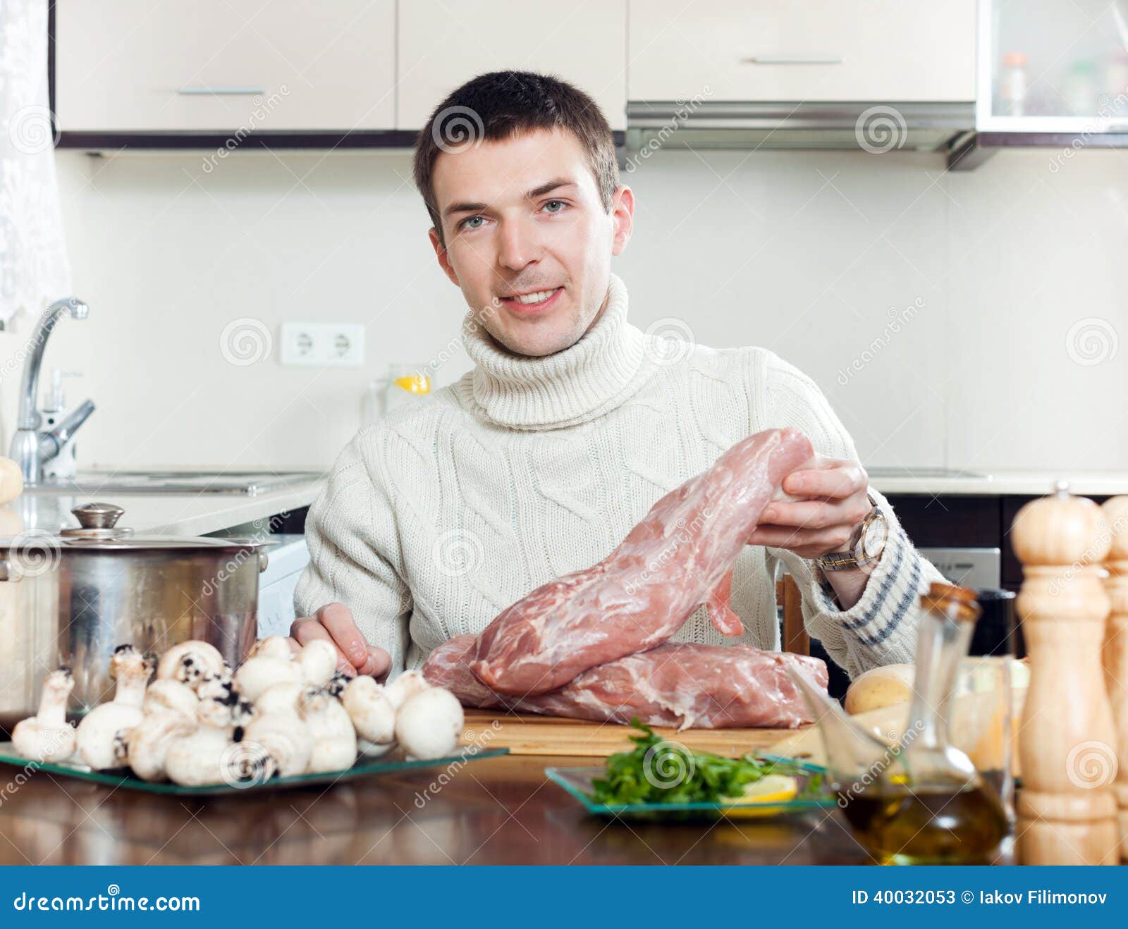 Man Cooking Meat with Mushrooms and Potatoes. Adding Champign Stock ...