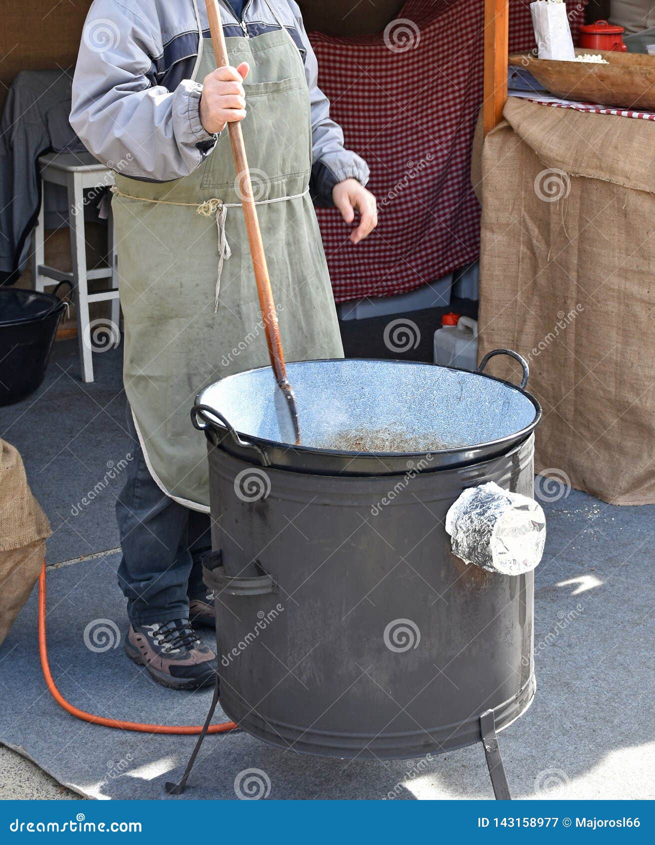 Man is cooking outdoor stock image. Image of culture - 143158977