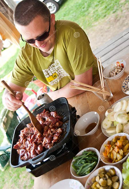 Man cooking outdoors stock photo. Image of grill, healthy - 24742038