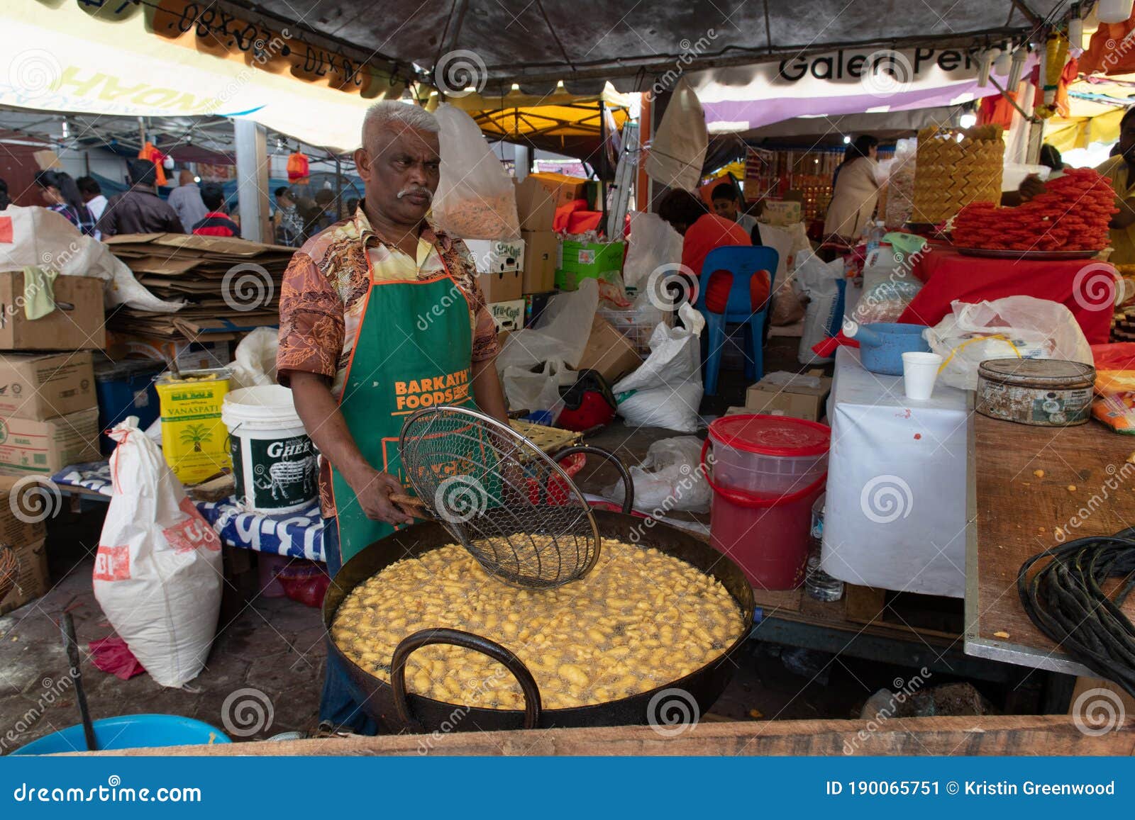 Man Cooking Pakora At Street Food Stall During Thaipusam At Batu Caves