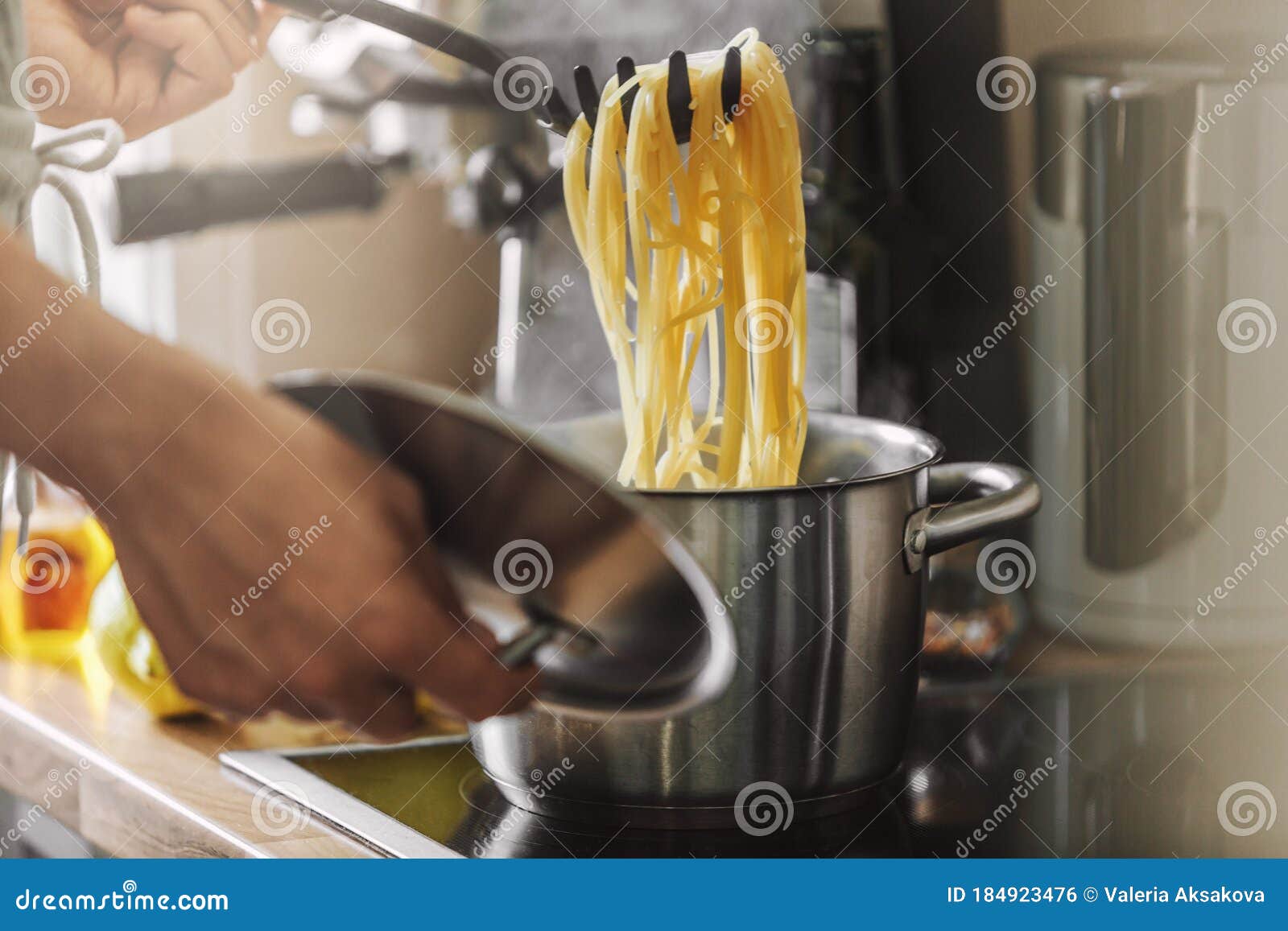 Man Cooking Pasta in the Kitchen Stock Photo - Image of people, fresh ...