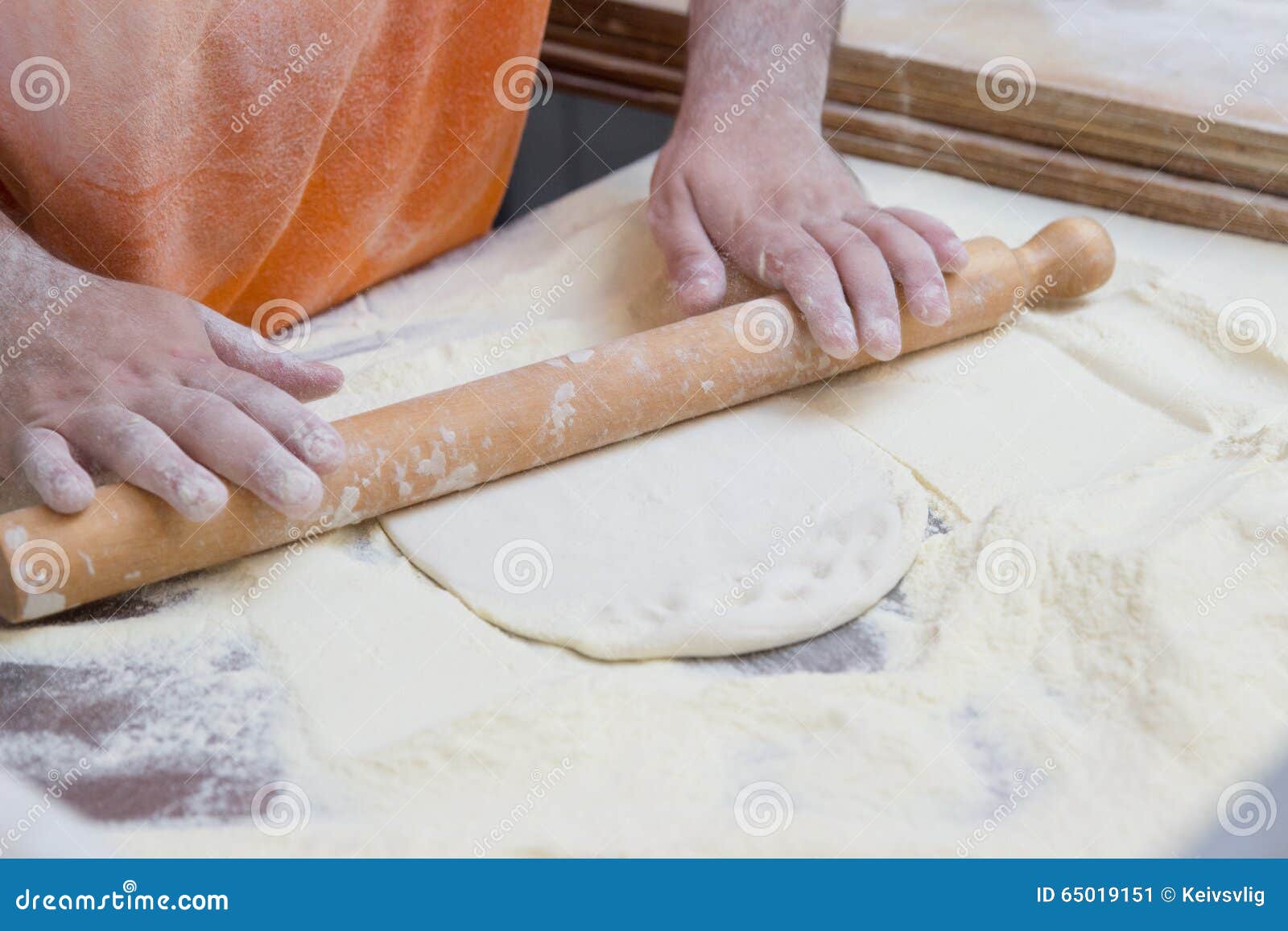 Man cooking pizza stock image. Image of pizza, flour - 65019151