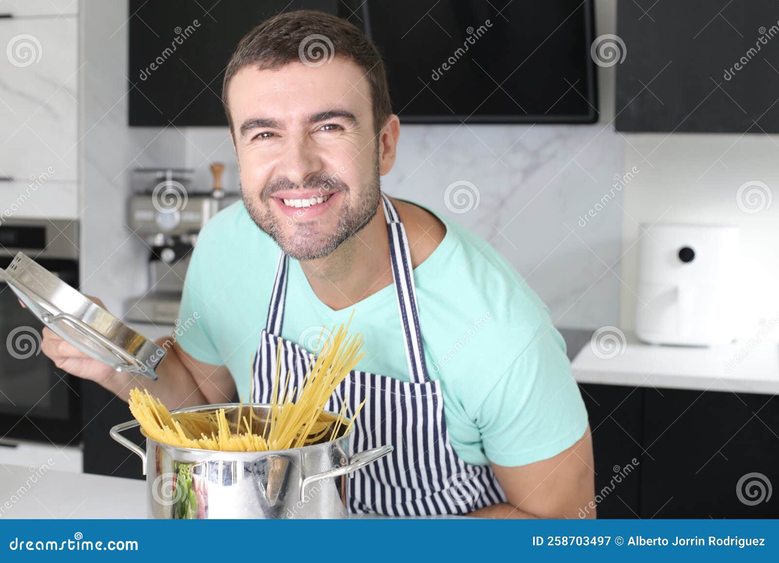 Man Cooking Spaghetti at Home Stock Image - Image of carbonara ...