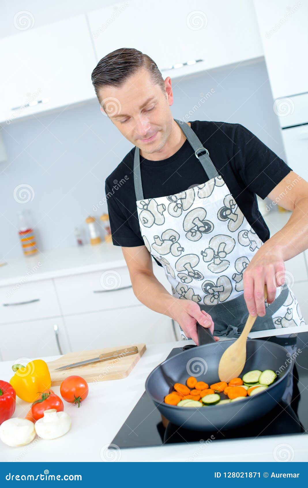 Man Cooking Vegetables at Home Stock Image - Image of profession ...