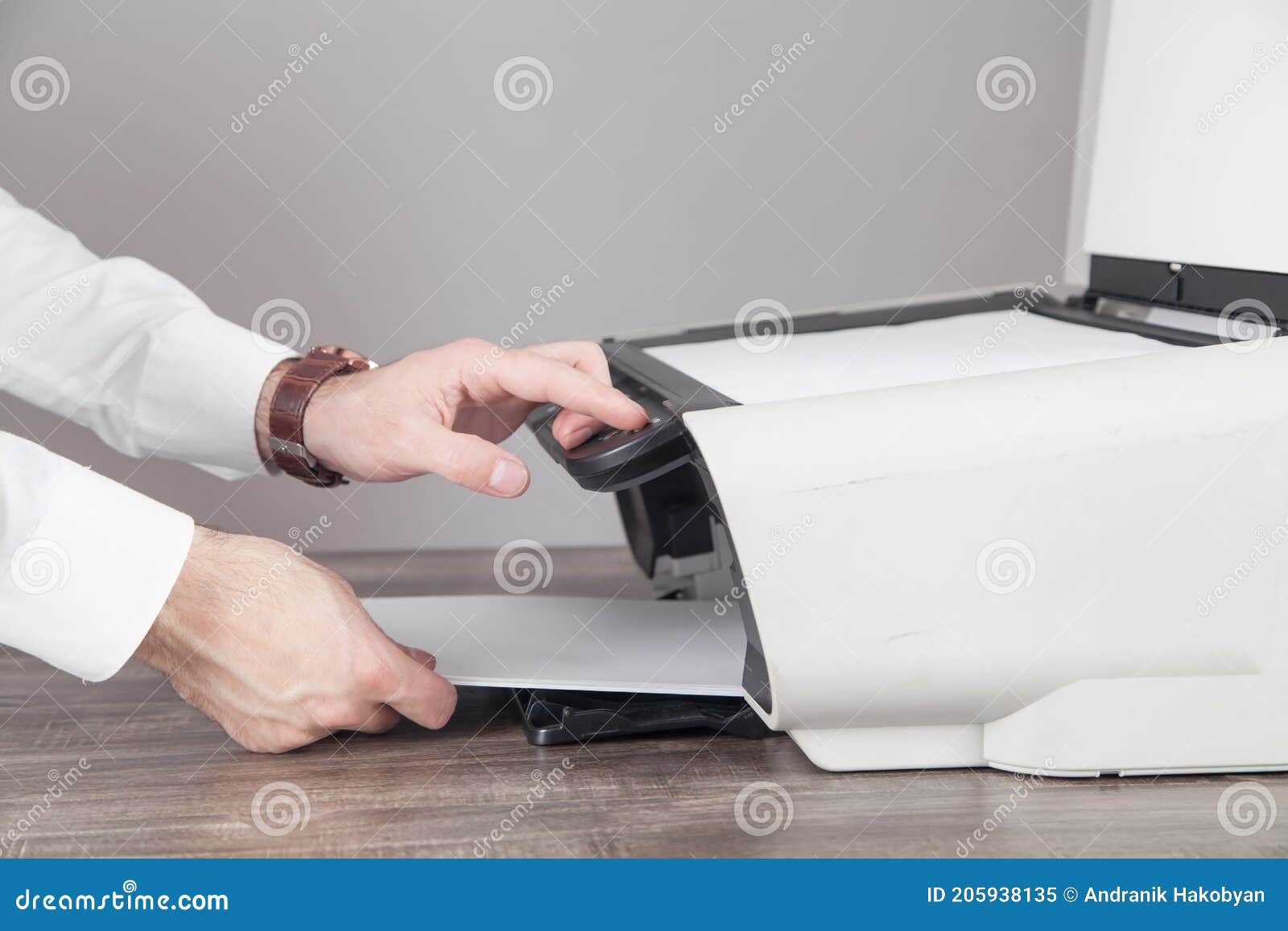 Man Copying and Scanning Documents in Office Stock Image - Image of ...