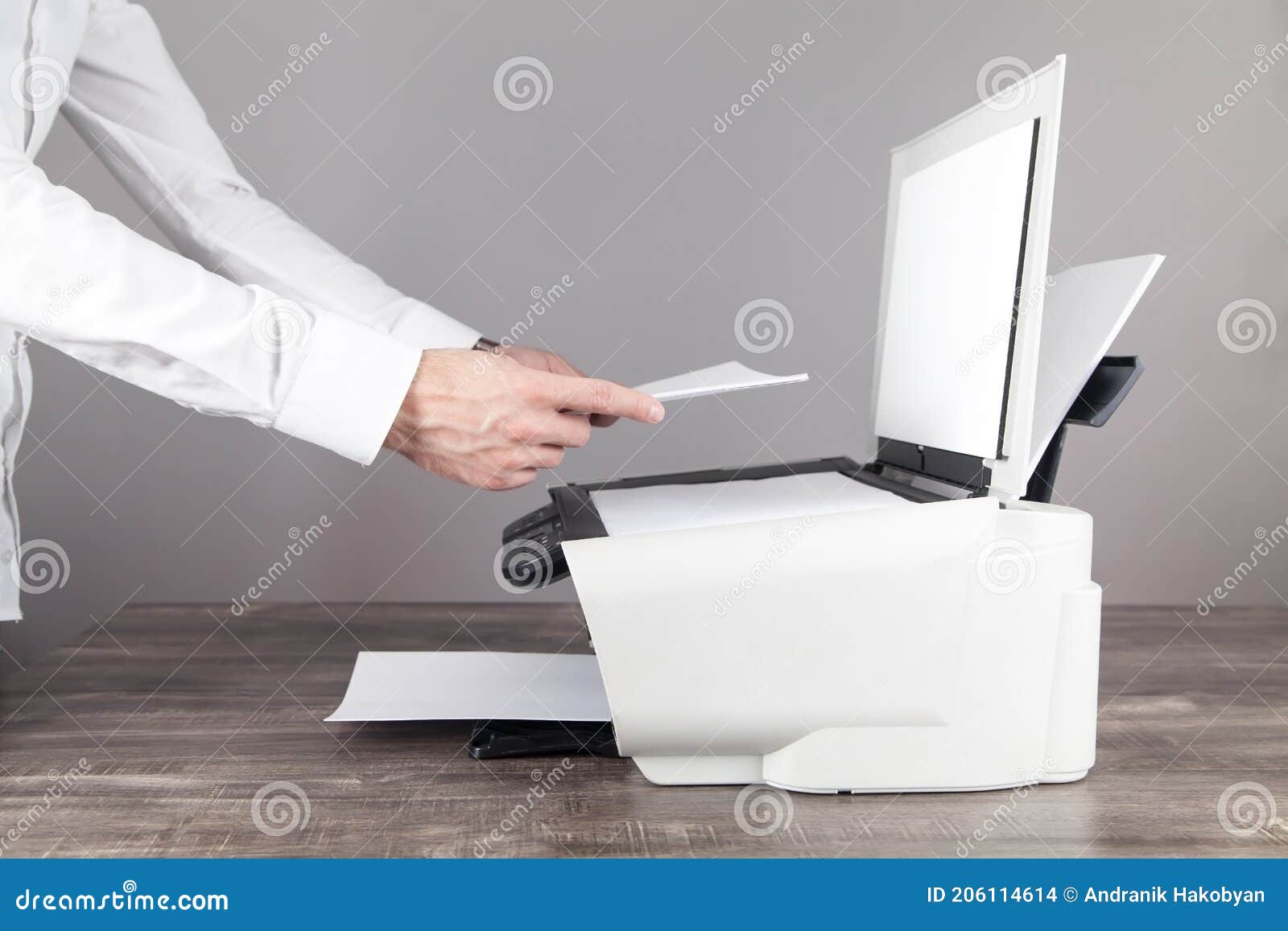 Man Copying and Scanning Documents in Office Stock Photo - Image of ...