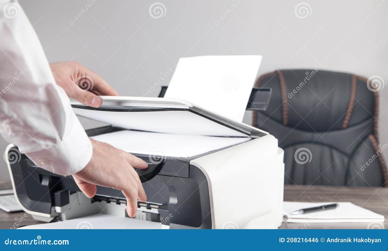 Man Copying and Scanning Documents in Office Stock Photo - Image of ...
