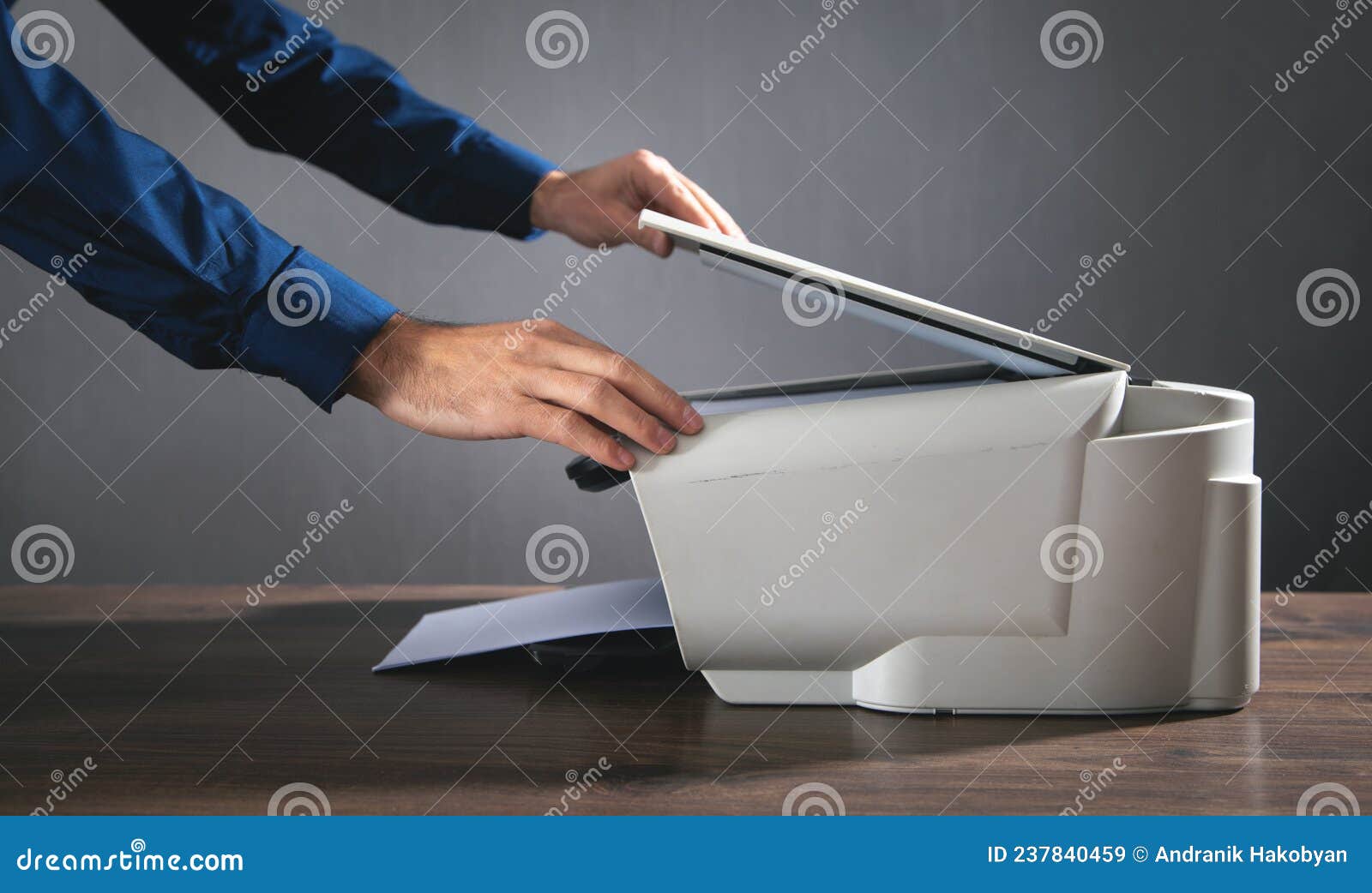Man Copying and Scanning Documents in Office Stock Image - Image of ...