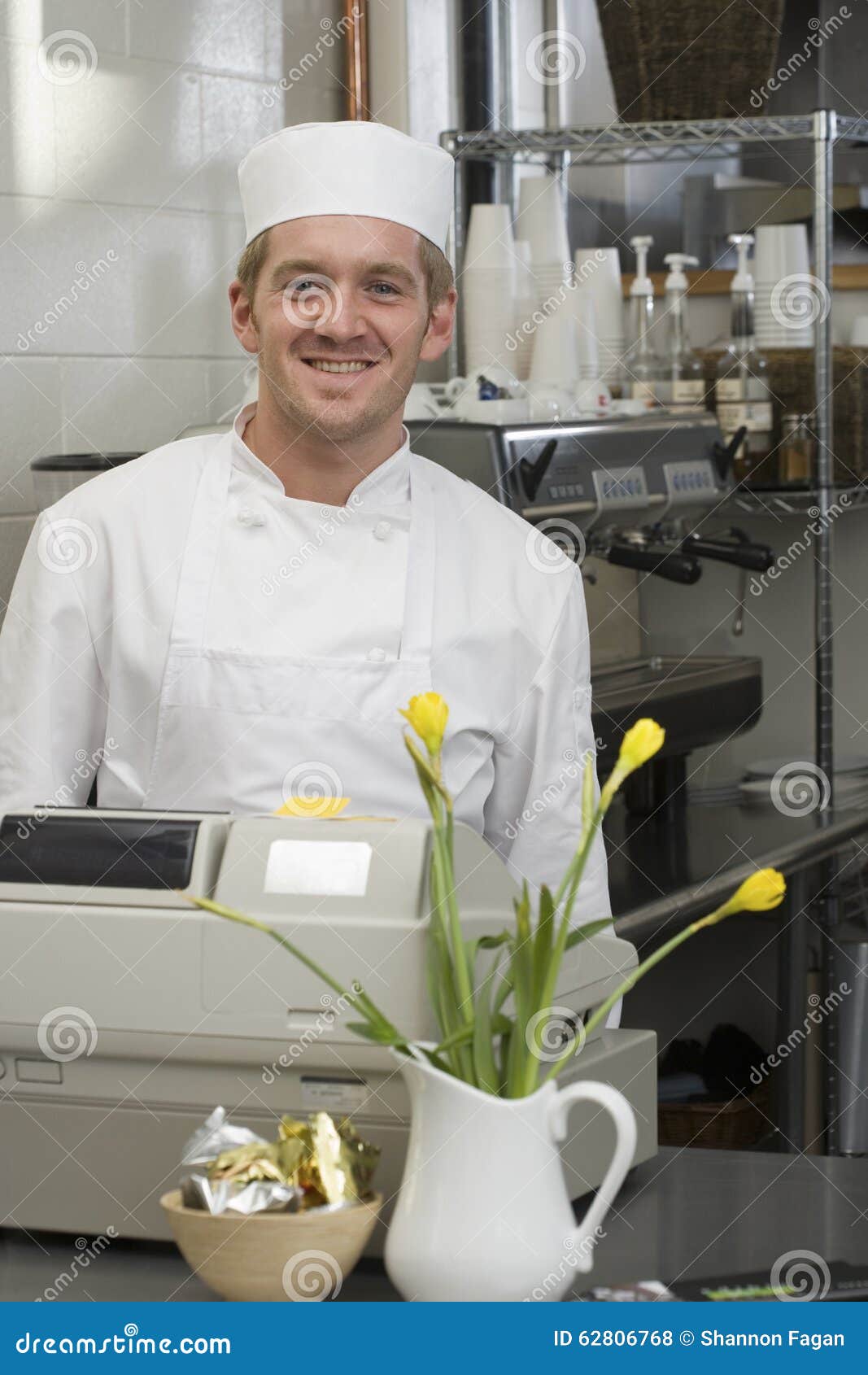 Man at counter in cafe stock photo. Image of counter - 62806768
