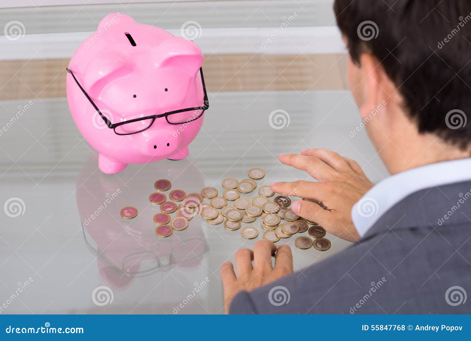 Man counting coins stock photo. Image of bookkeeping - 55847768